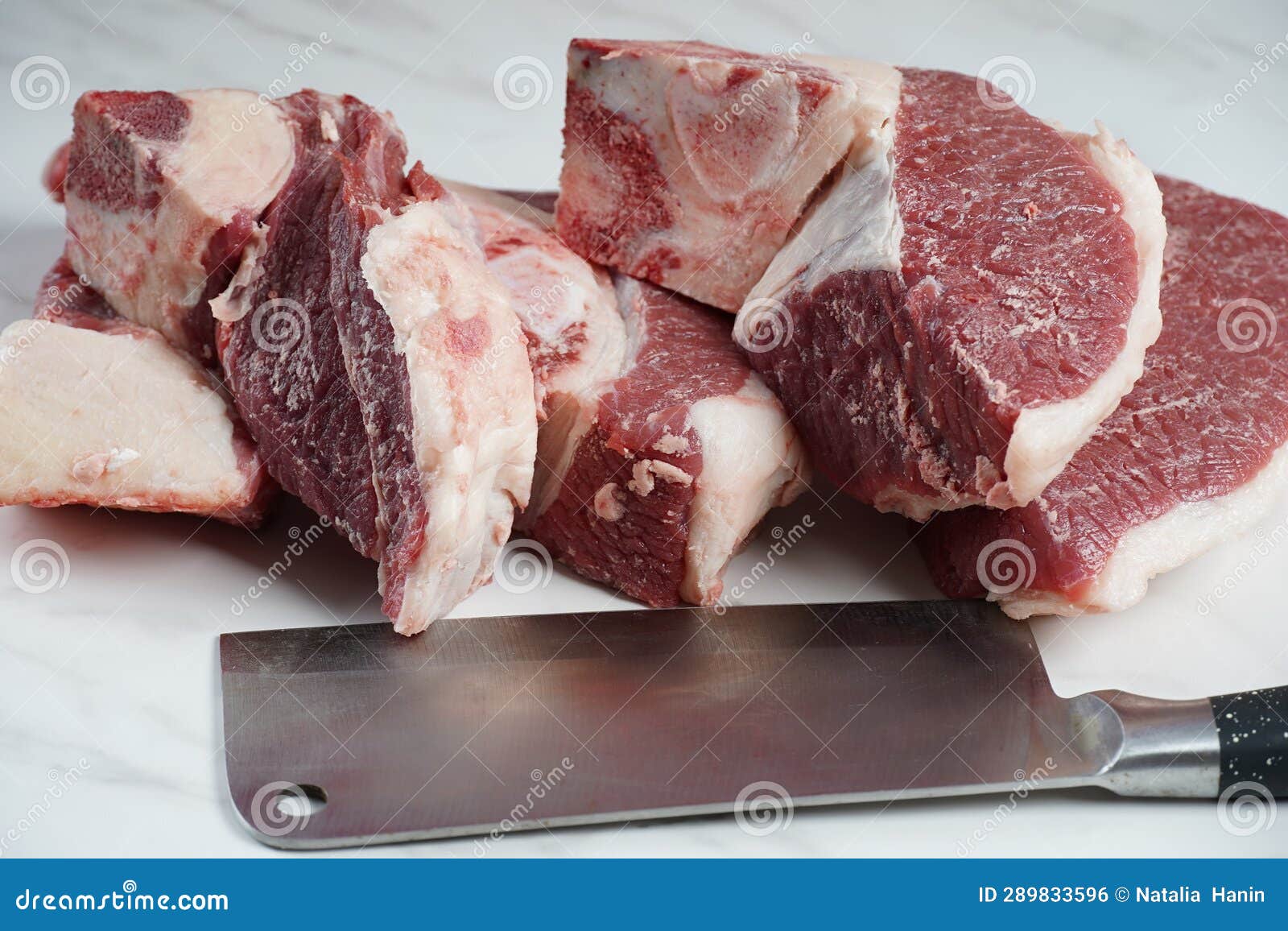 Fresh Raw Beef Steaks with Bone on Cutting Board Ready for Cooking ...