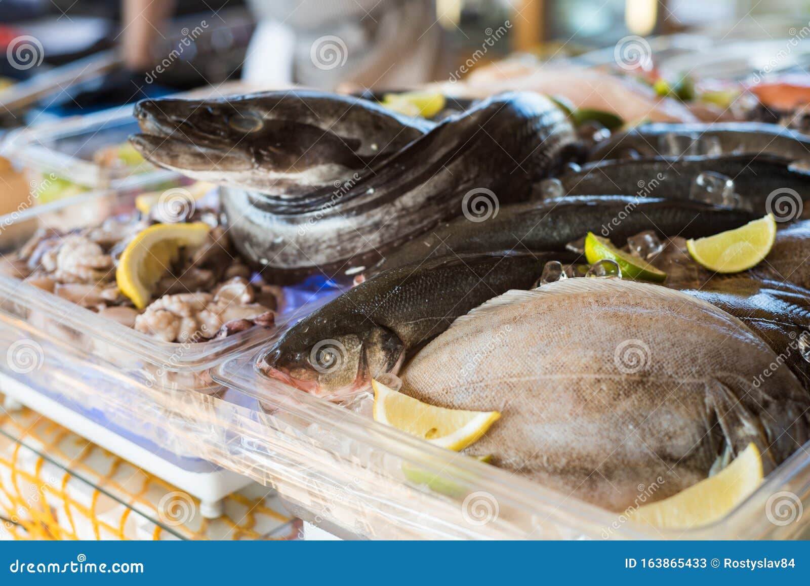 Fresh Raw Eel Fish with Other Different Seafood at the Fish Market ...