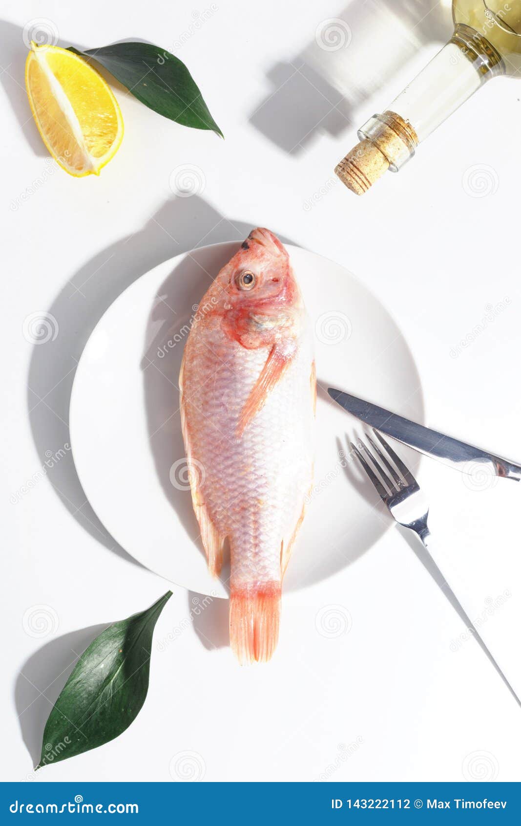 Fresh Raw Fish on a Plate. Table Setting Stock Photo - Image of greek ...
