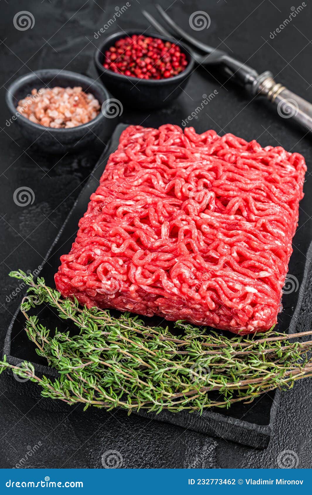 Fresh Raw Mince Ground Beef Meat with Thyme. Black Background Stock ...