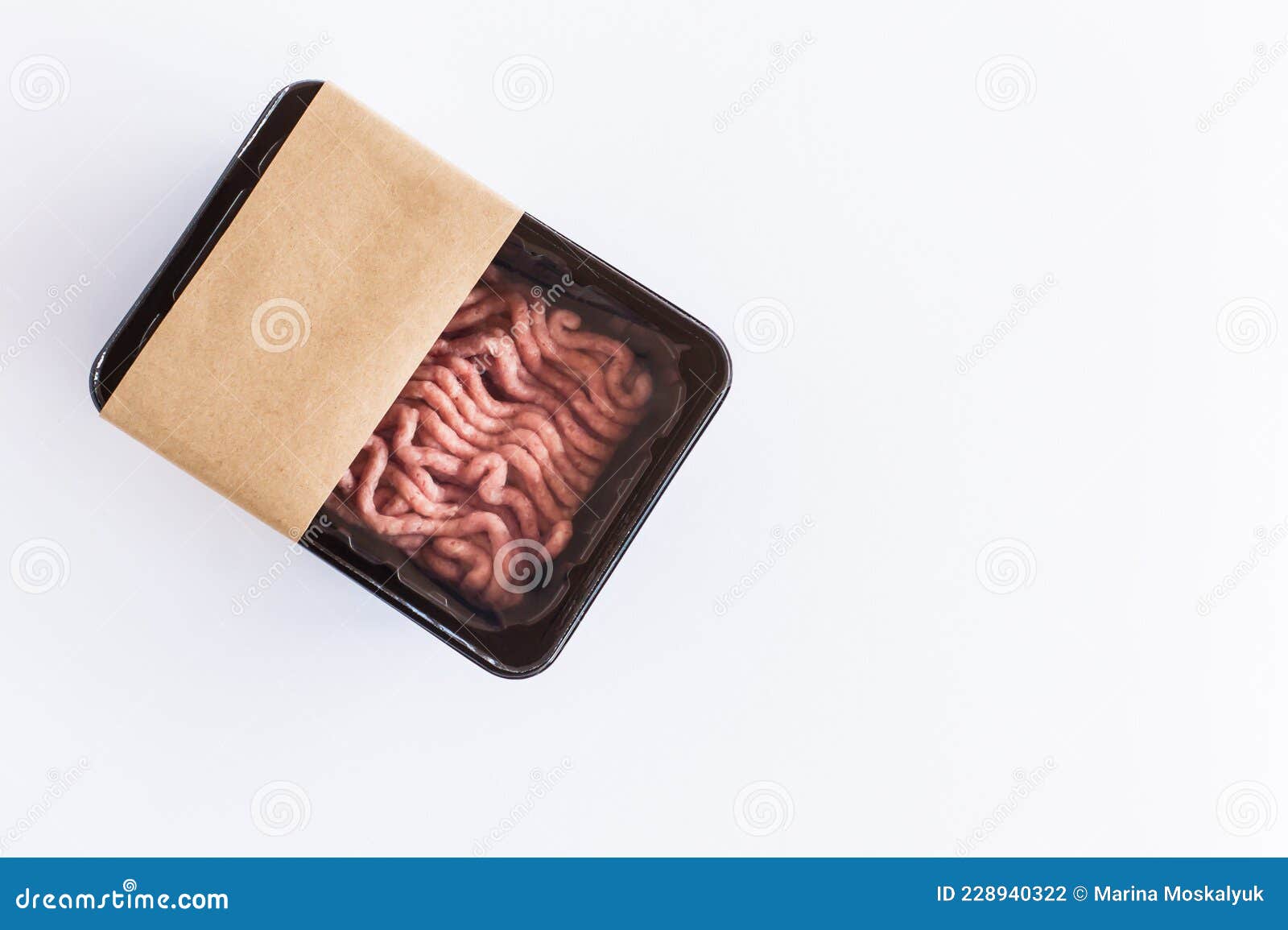 Fresh Raw Minced Meat in Plastic Vacuum Packaging on a White Background ...