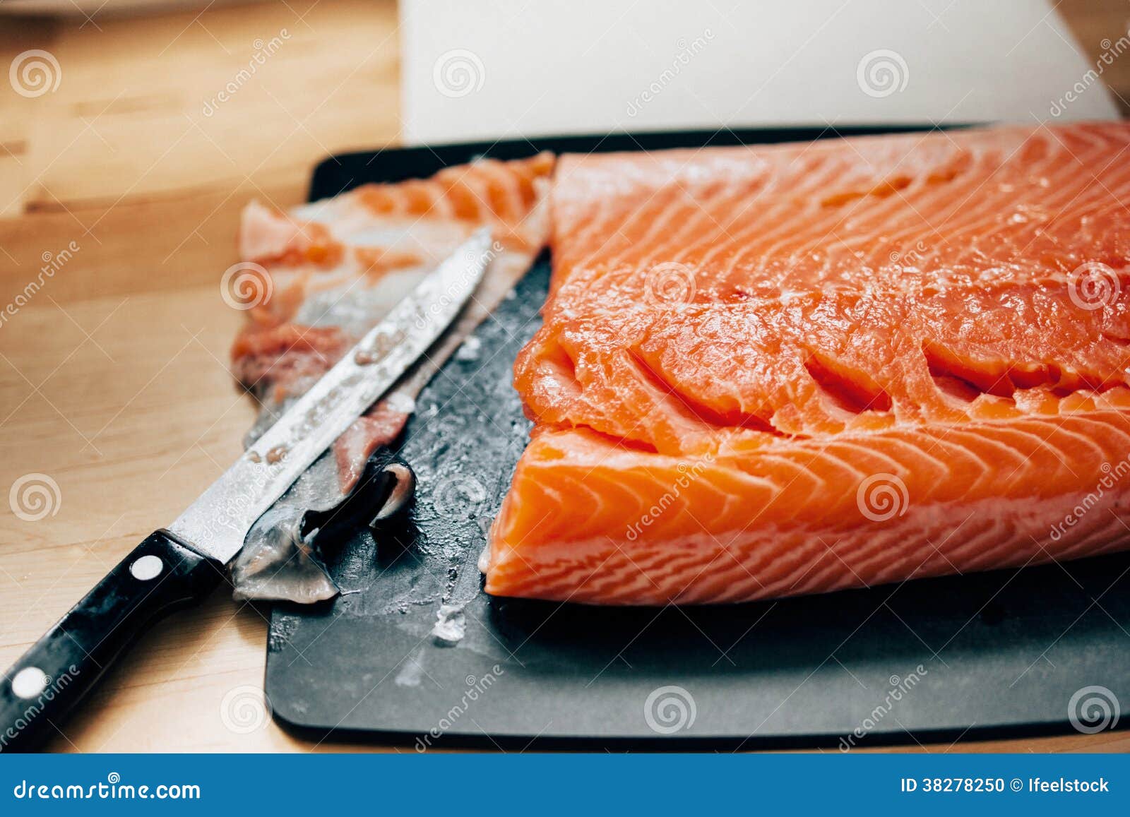 Fresh Raw Salmon in Kitchen Stock Photo - Image of knife, piece: 38278250