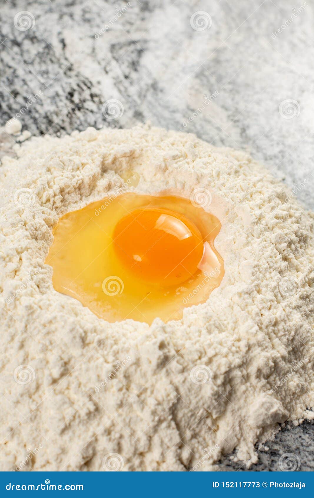Fresh Raw Smashed Egg in the White Flour Pile Stock Image - Image of ...