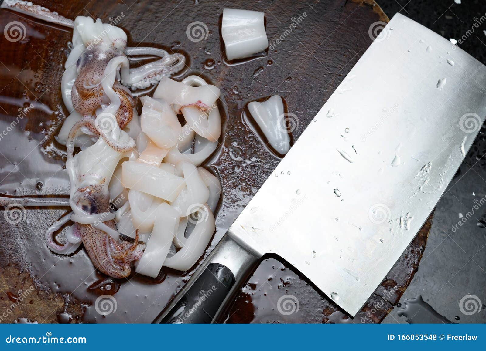 Fresh Raw Squids Being Cut in Pieces Stock Photo - Image of fresh ...