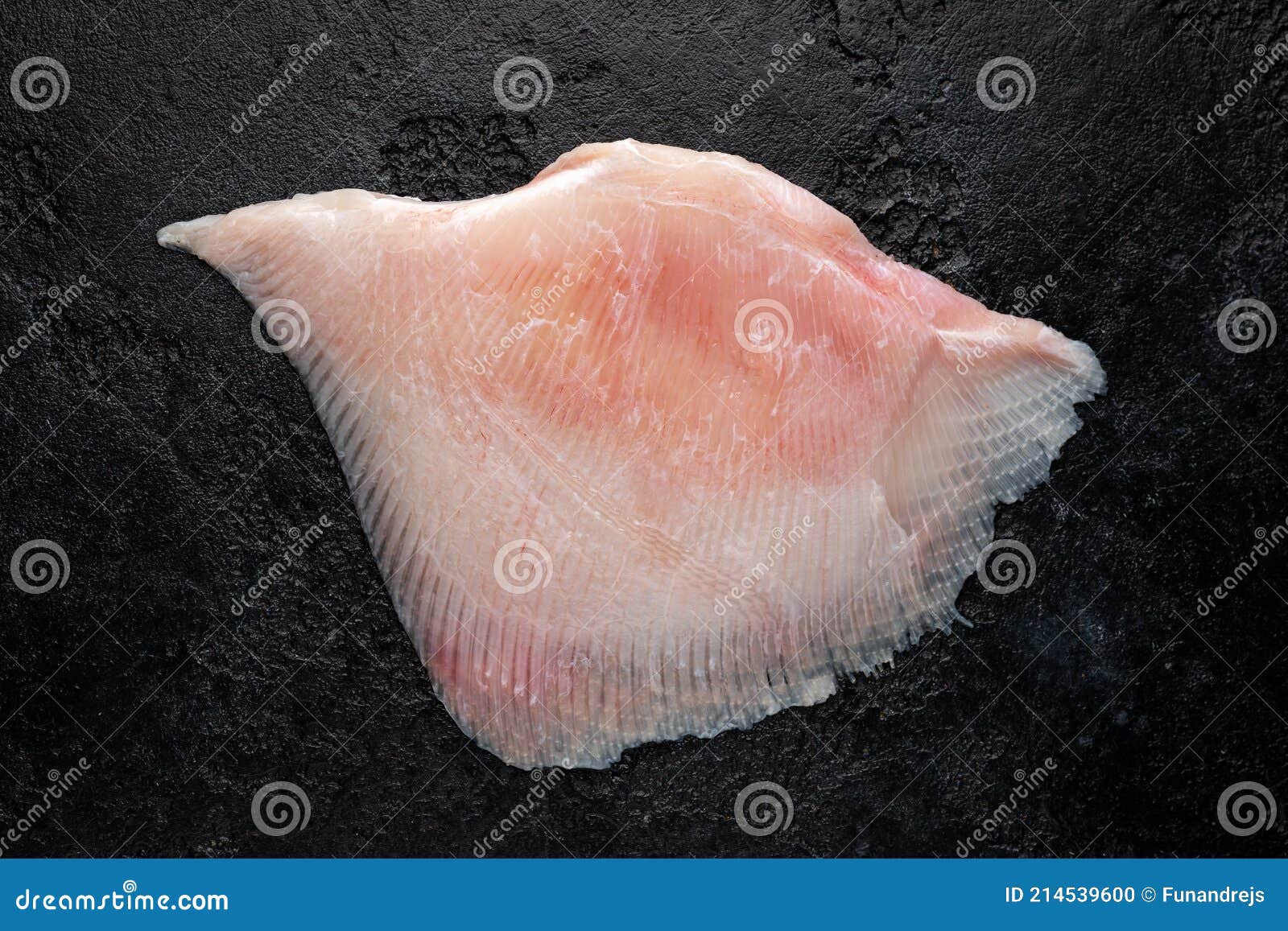 Fresh Ray Wings Fish on Rustic Black Background Stock Photo - Image of ...