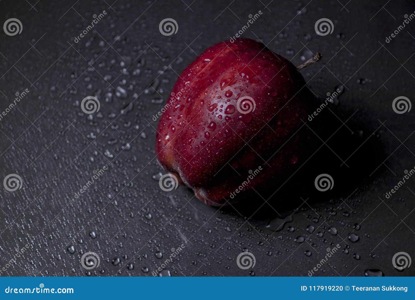 Fresh Red Apple with Droplets of Water and Have Light Stock Photo ...