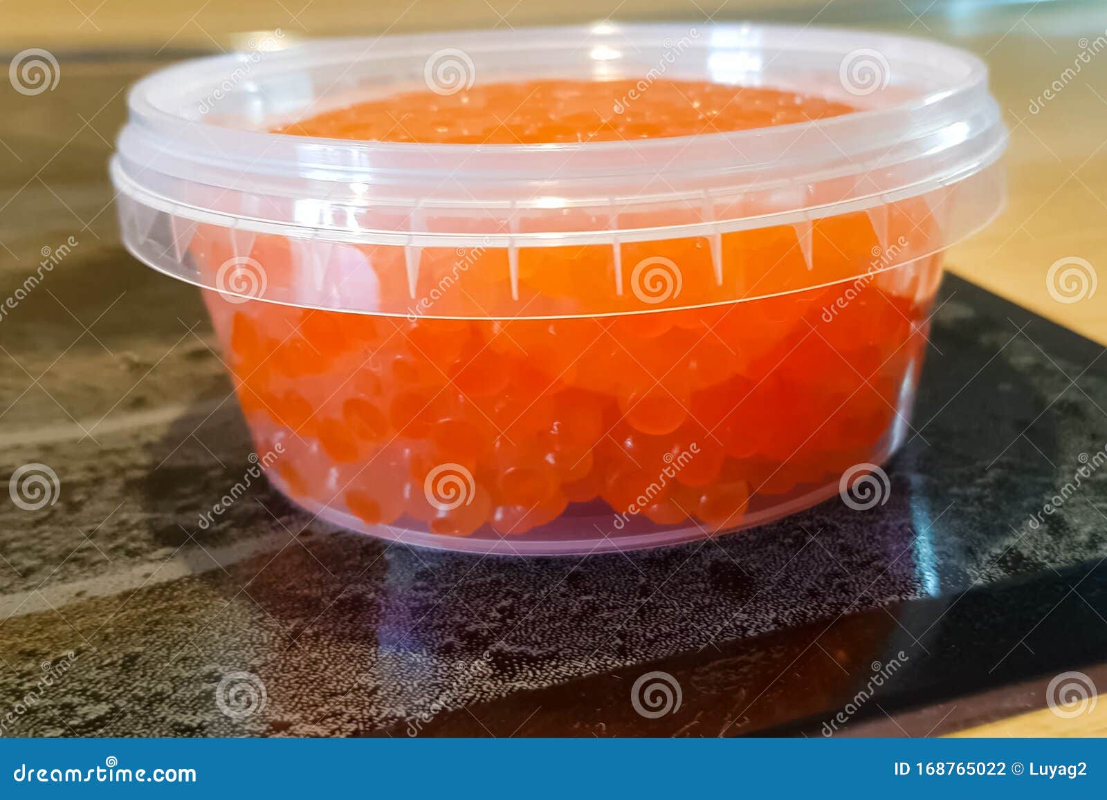 Fresh Red Caviar in Plastic Transparent Container Stock Photo - Image ...