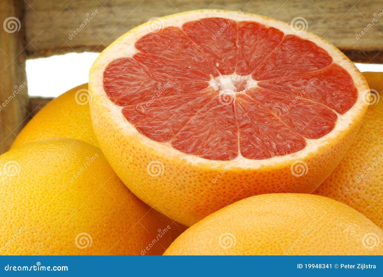 Fresh Red Grapefruits and a Cut One Stock Image - Image of groceries ...