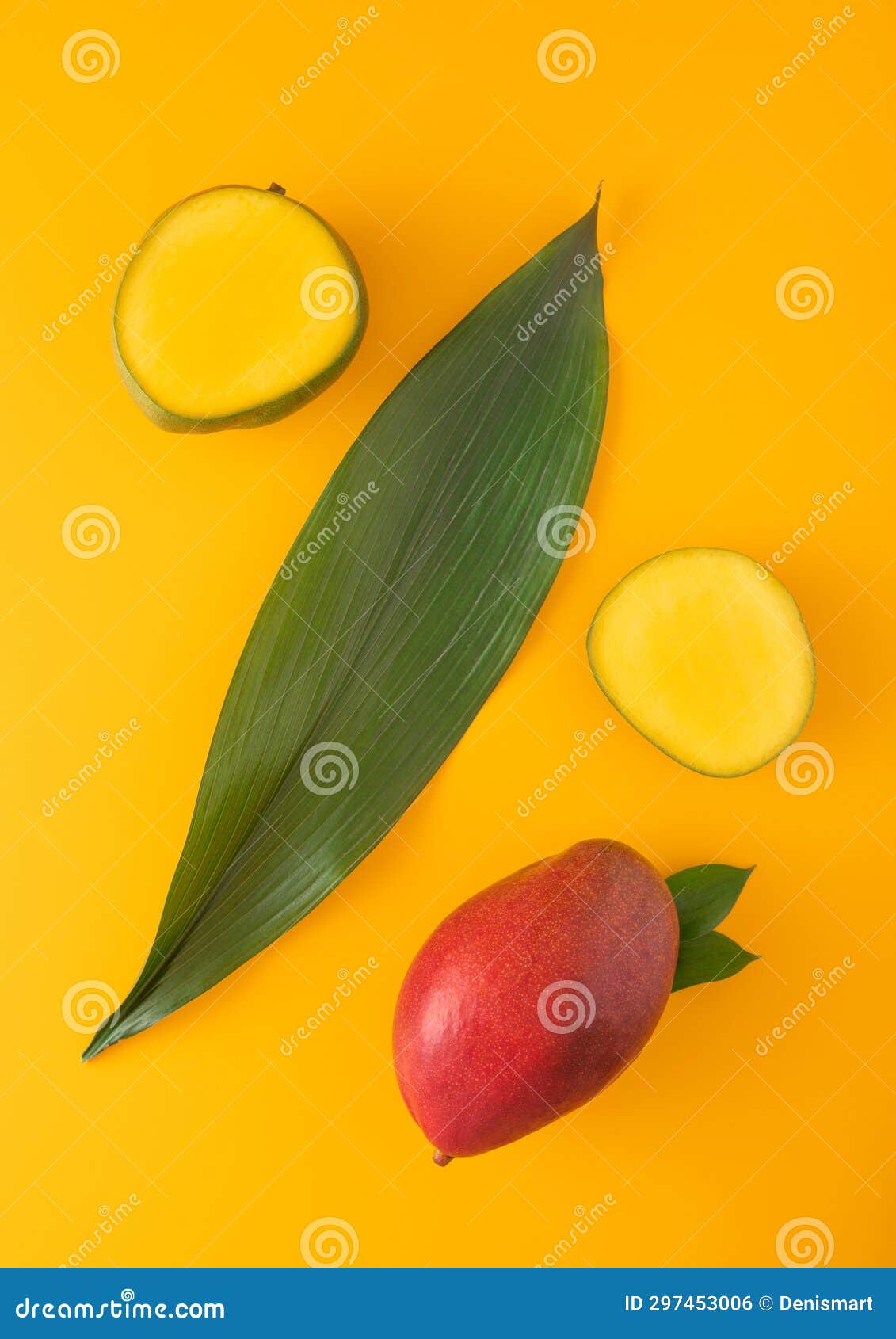 Fresh Red Mango and Two Halves and Large Leaf on Yellow Background ...