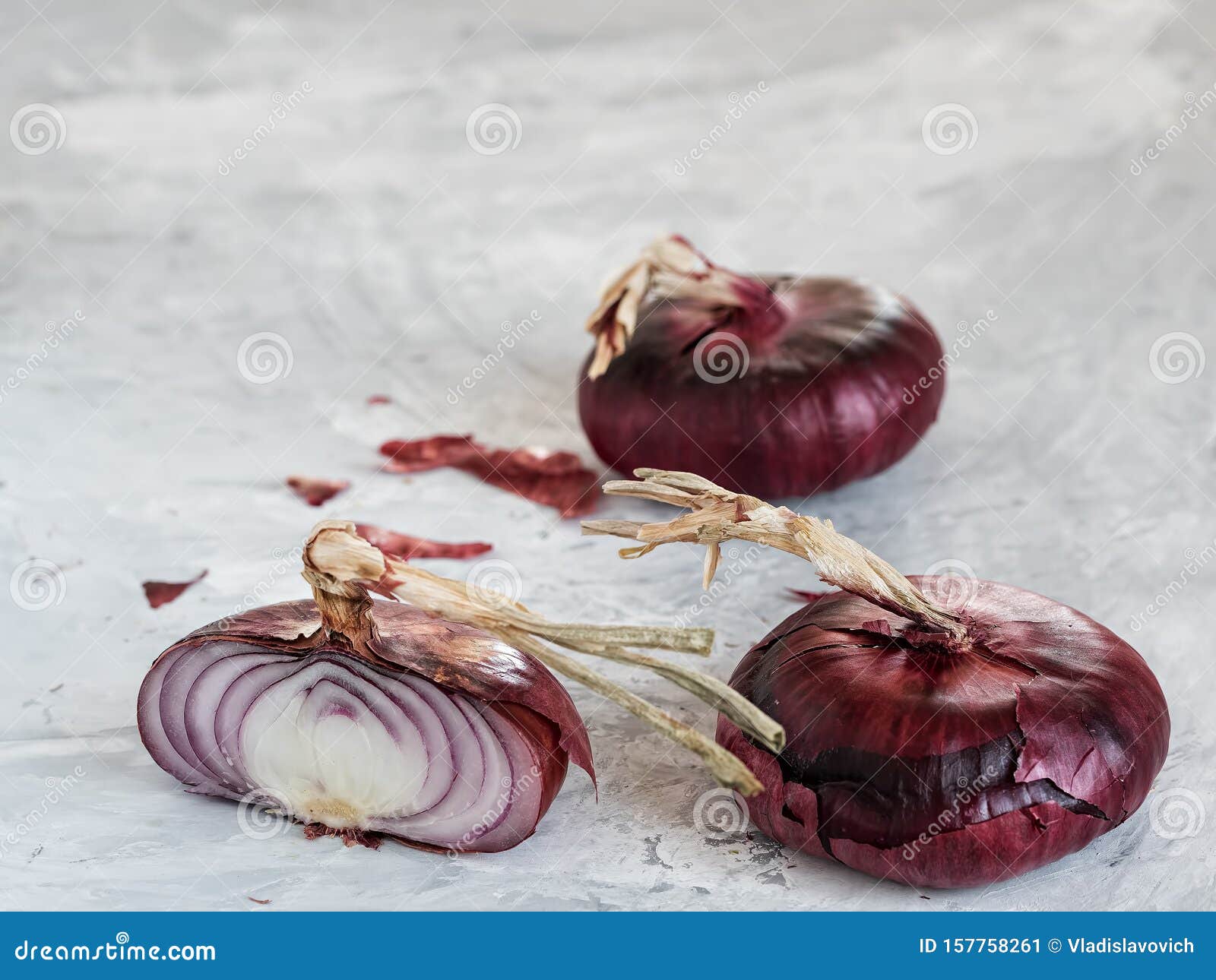 Fresh Red Onions. Three Onion on a Gray Background. One Onion is Cut in ...