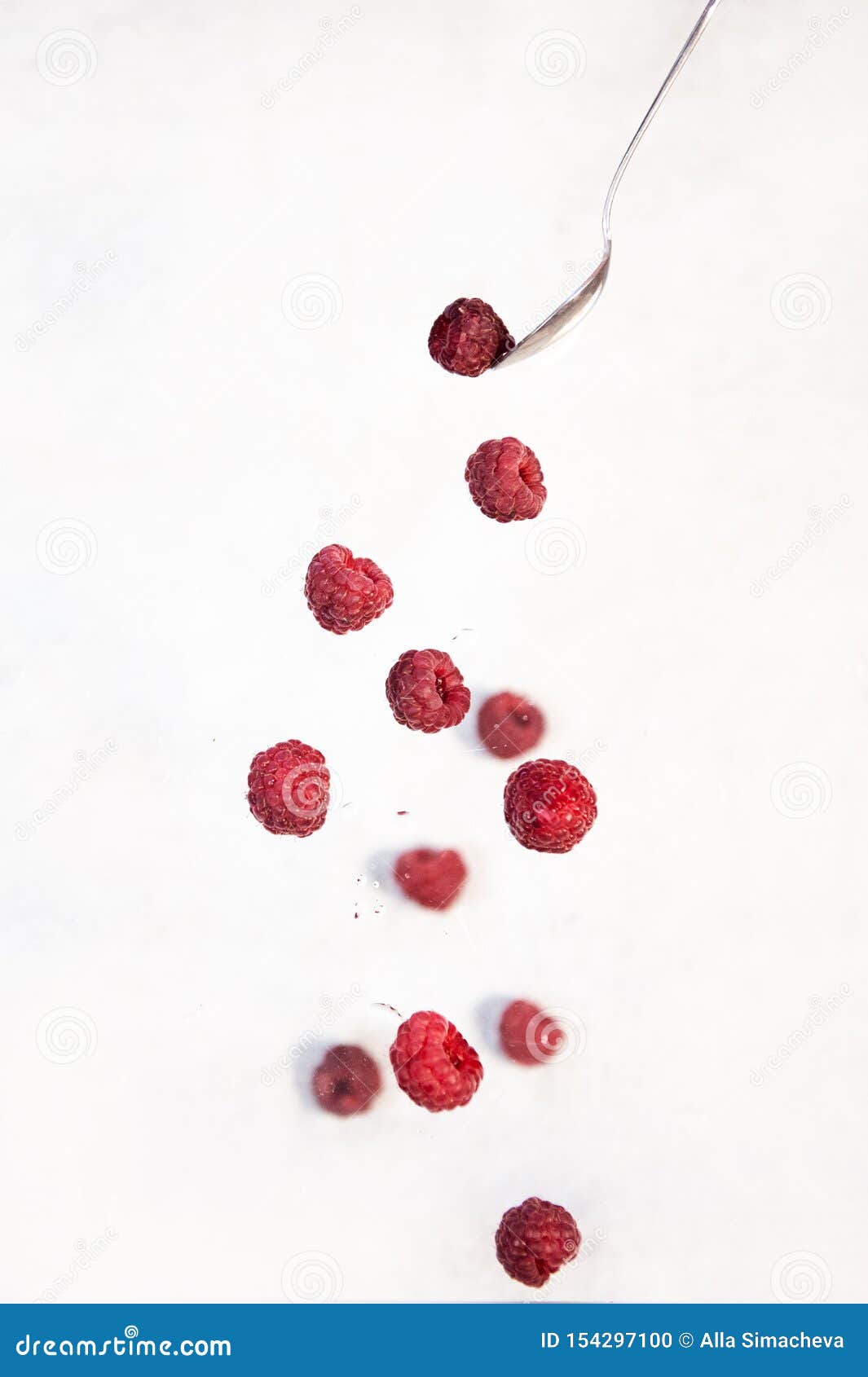 Fresh Red Raspberries Falling Isolated on White Background Stock Photo ...