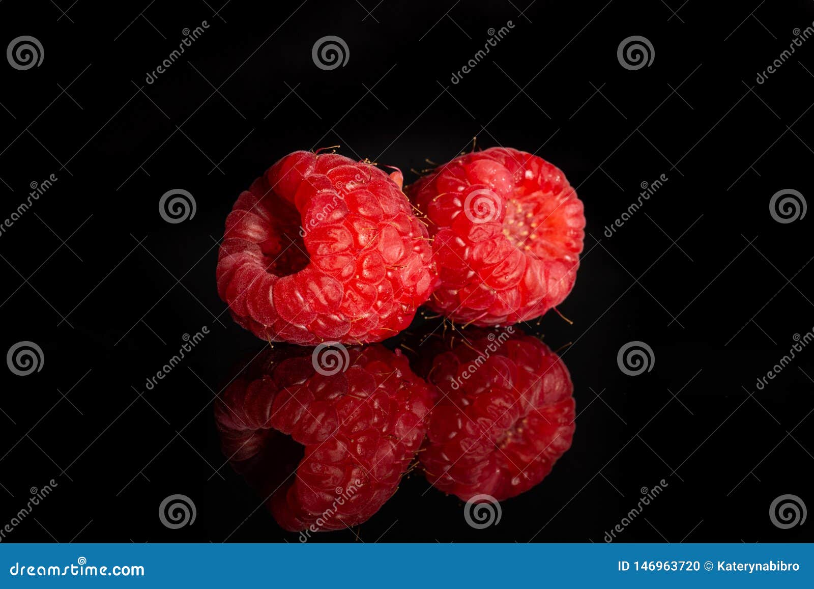 Fresh Red Raspberry Isolated on Black Glass Stock Photo - Image of ...