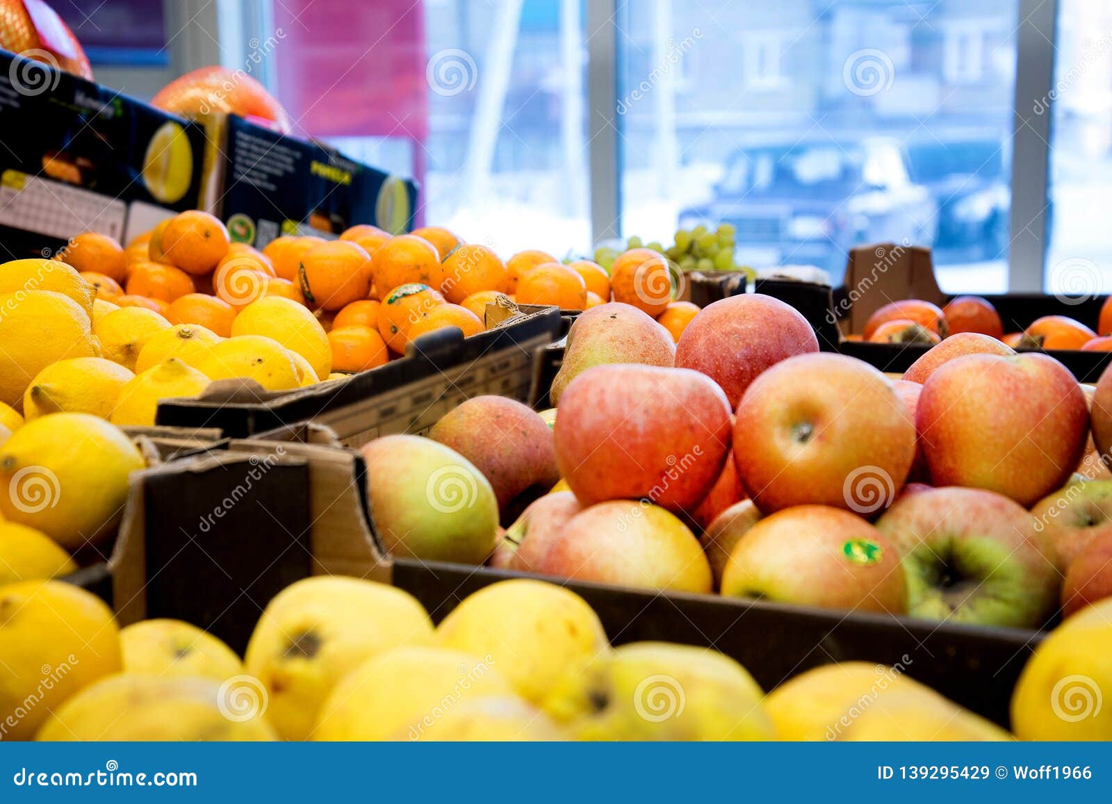Fresh Ripe Fruit on a Shop Counter Near a Large Storefront Stock Image ...