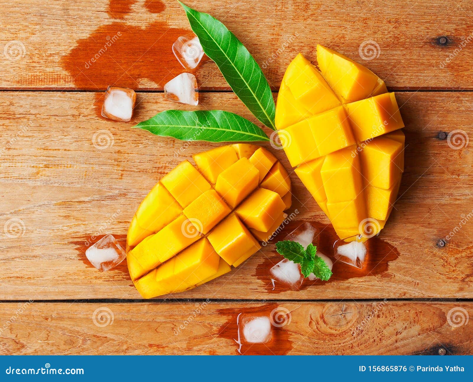 Ripe Mango Cut in Dice Shape on Wooden Table. Stock Photo - Image of ...