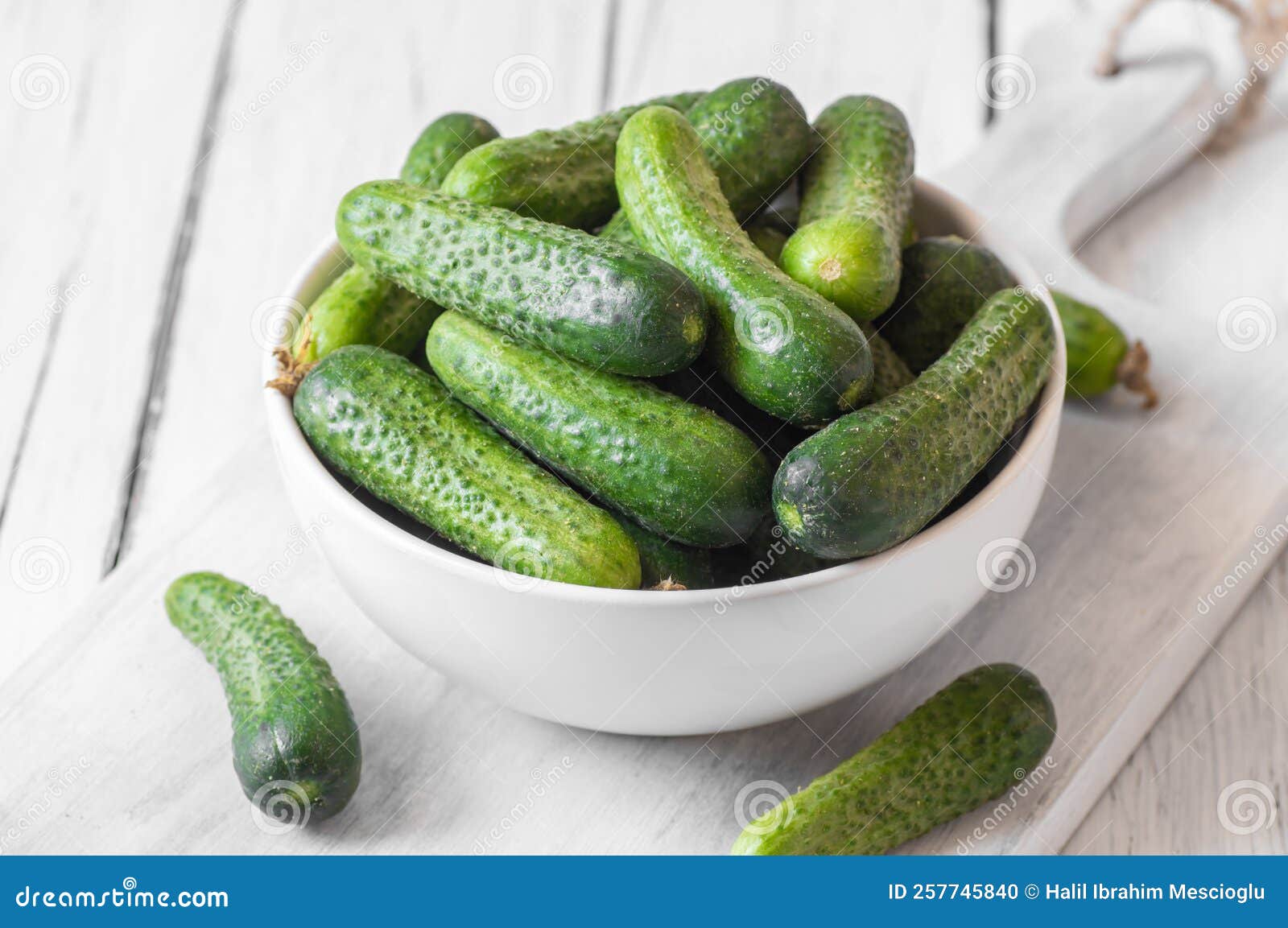 Fresh Ripe Organic Small Gherkin Cucumbers in Bowl on Wooden Table ...