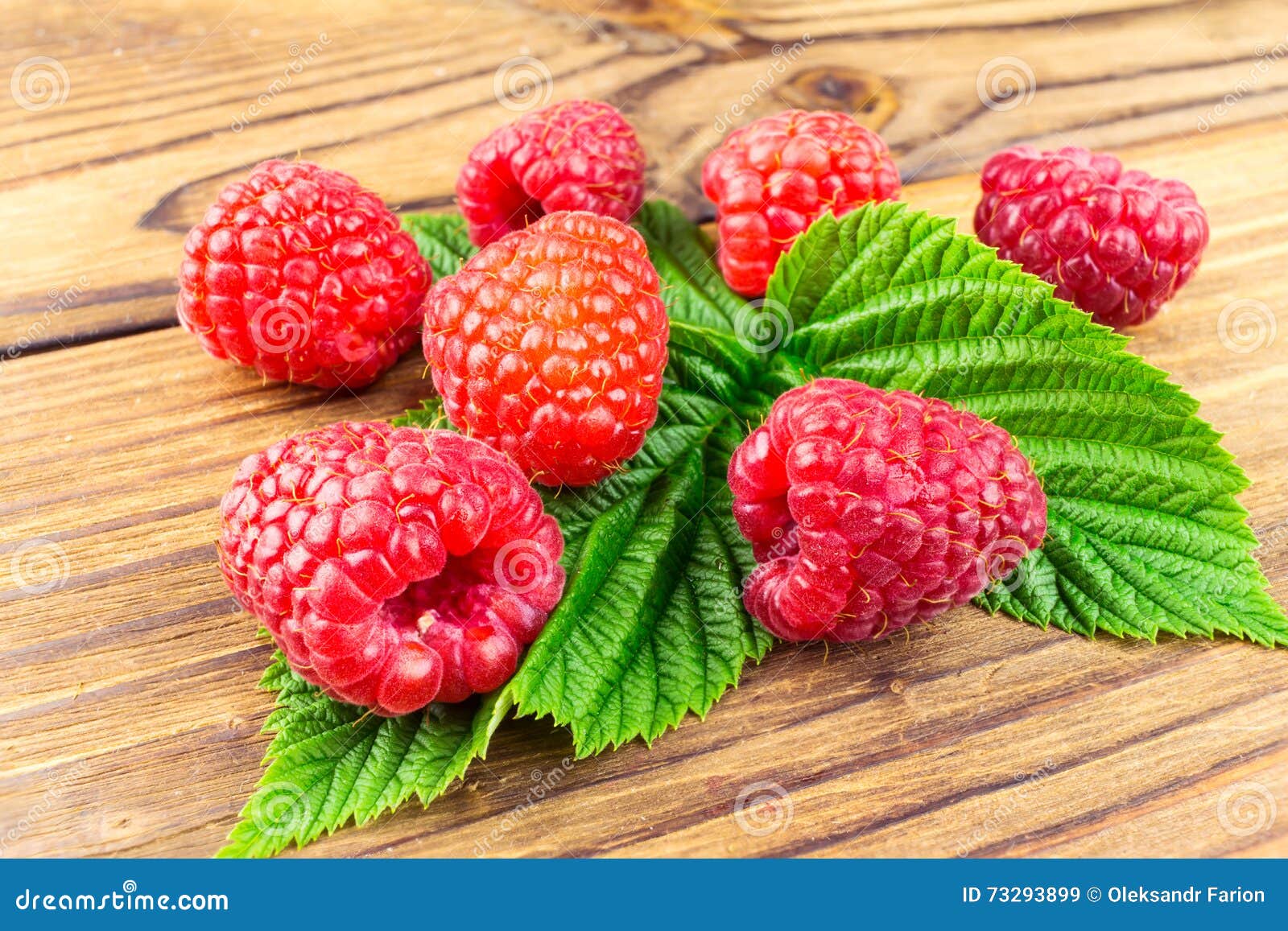 Fresh, Ripe Raspberries on Leaves, Rustic Wooden Background. Stock ...