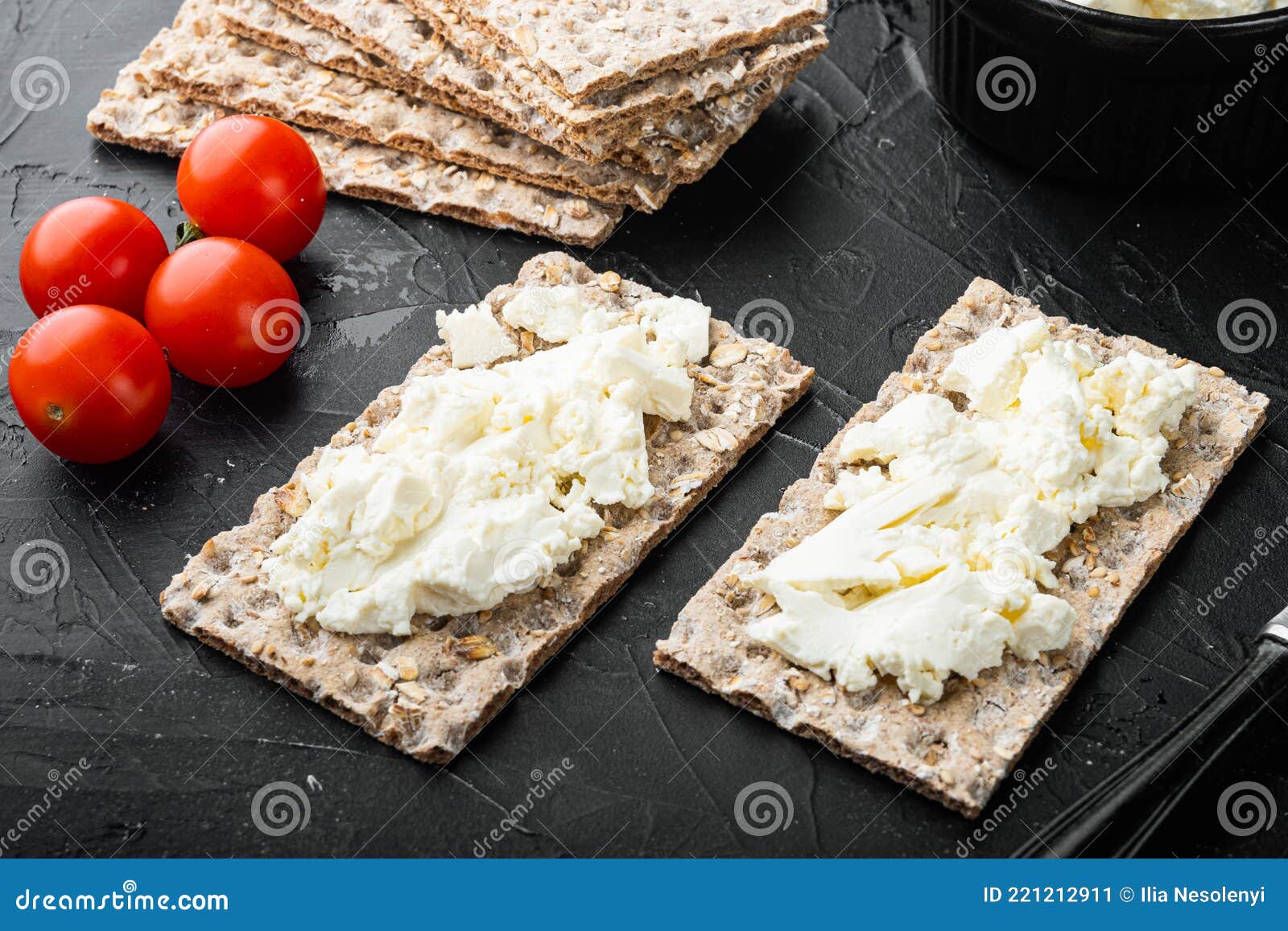 Fresh Rye Crispbreads with Different Topping, on Black Dark Stone Table ...
