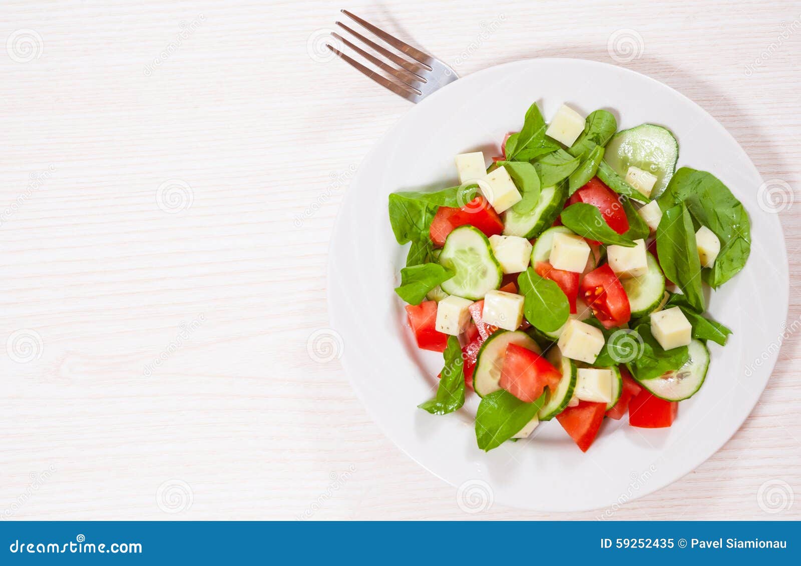 Fresh Salad with Tomatoes, Arugula, Cucumber and Cheese Cubes Stock ...