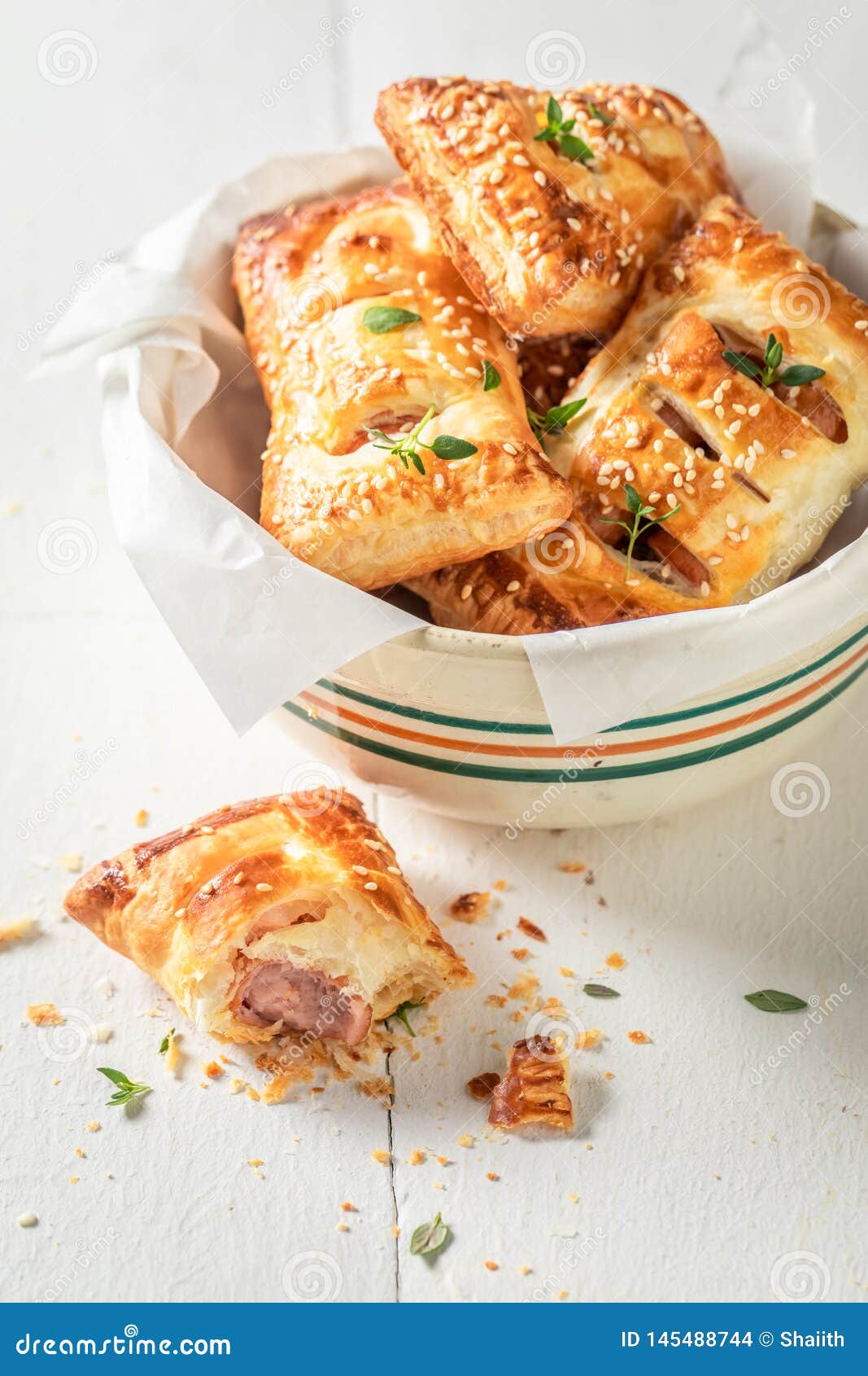 Fresh Sausage in Puff Pastry with Thyme and Sesame Seeds Stock Photo ...