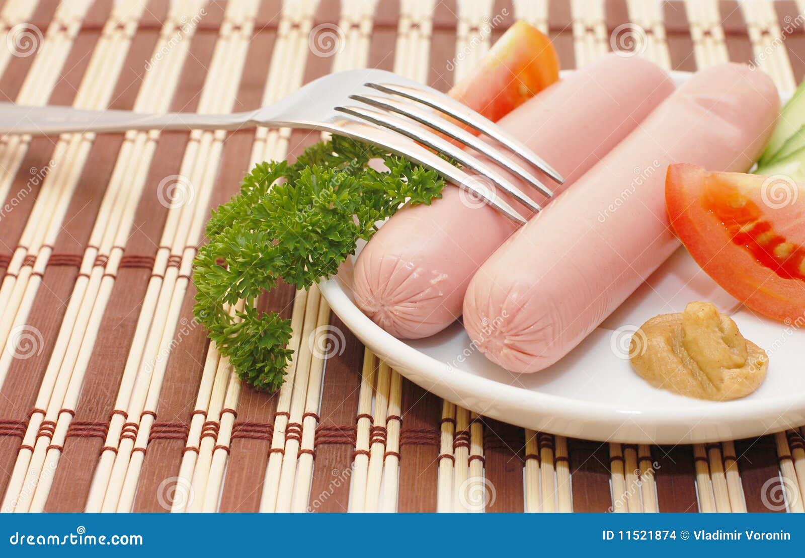 Fresh sausages on a plate stock photo. Image of portion - 11521874