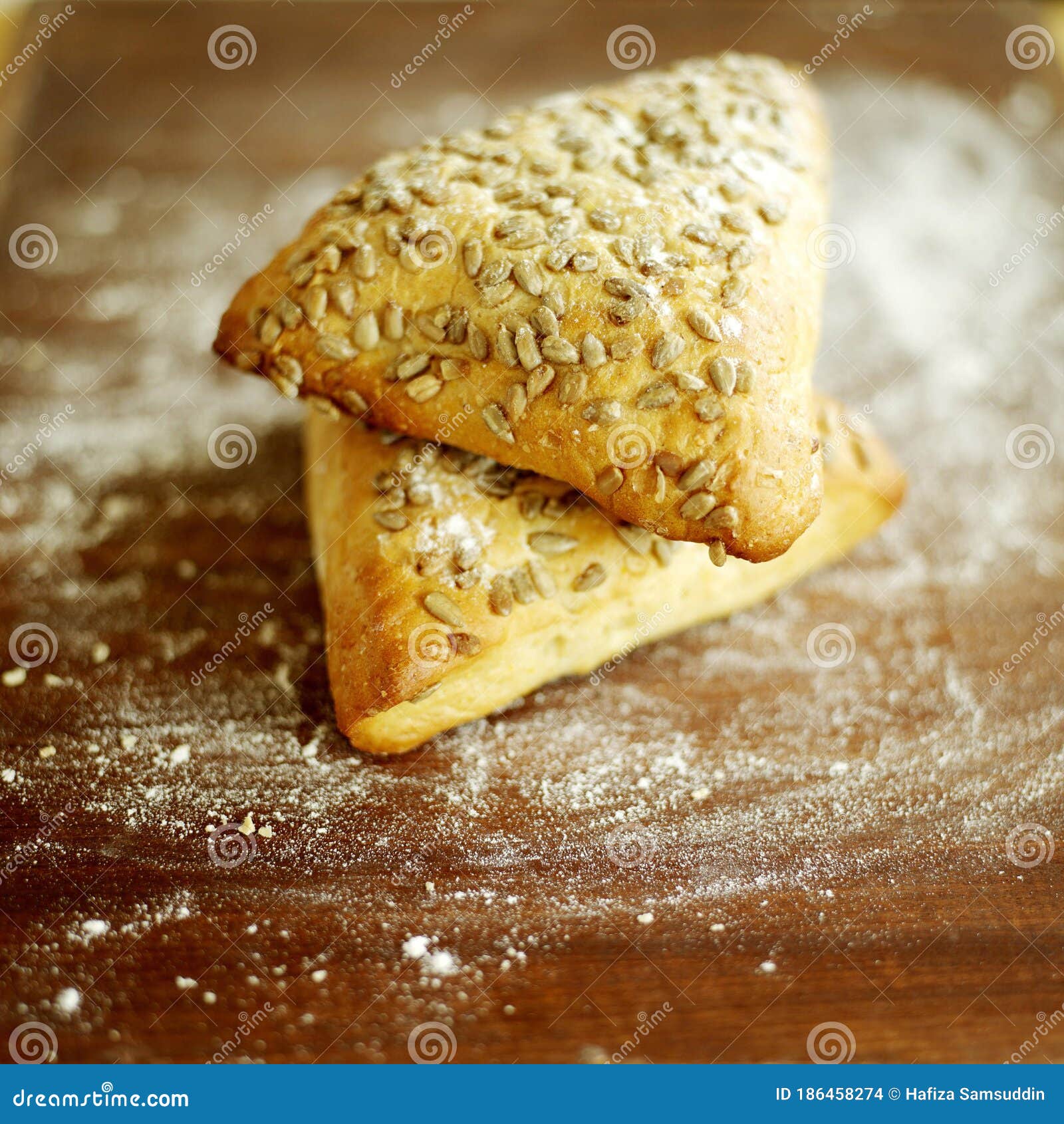 Fresh Seeded Triangular Italian Bread Rolls Stock Photo - Image of ...