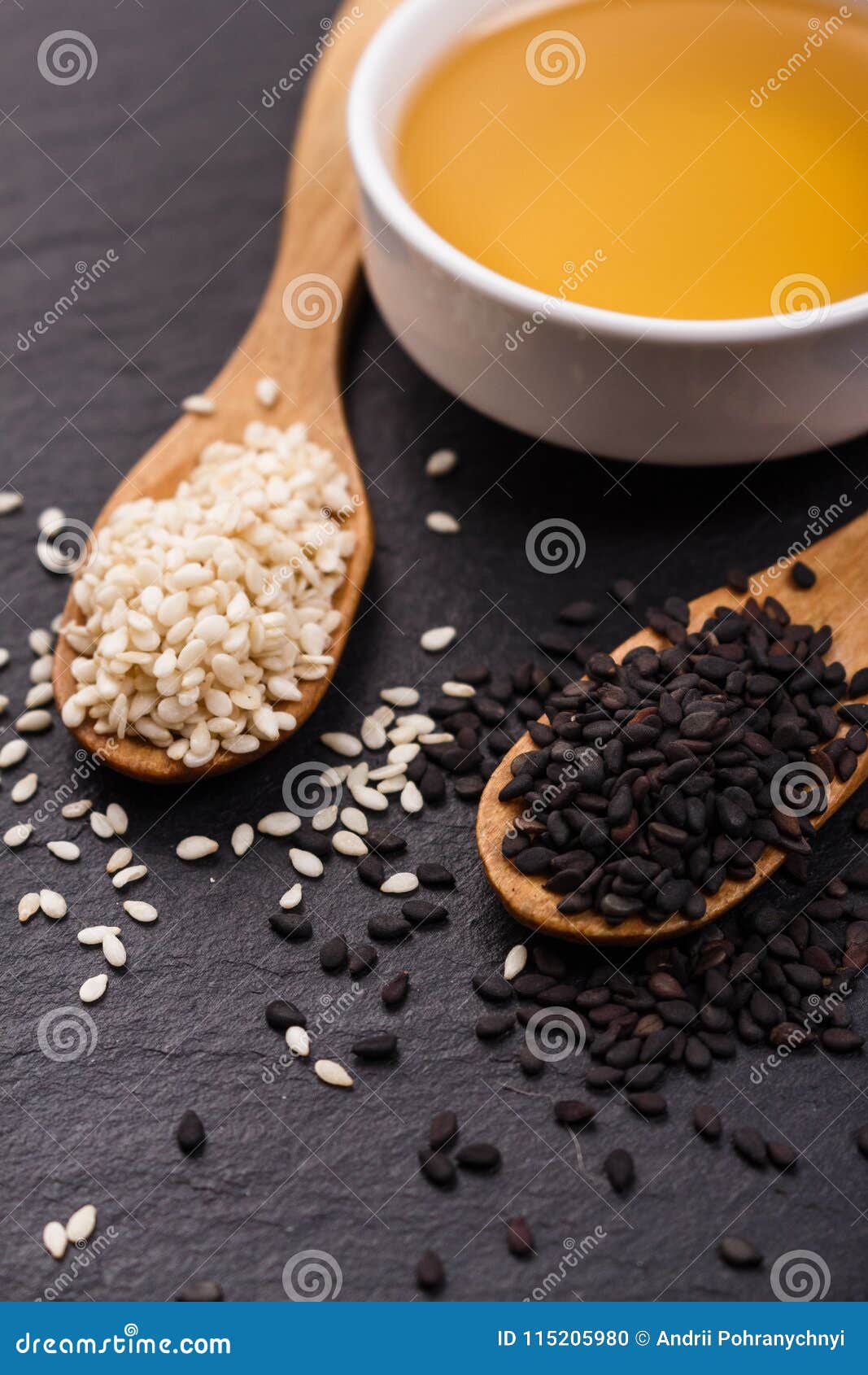 Fresh Sesame Seeds on a Rustic Background Stock Photo - Image of bottle ...