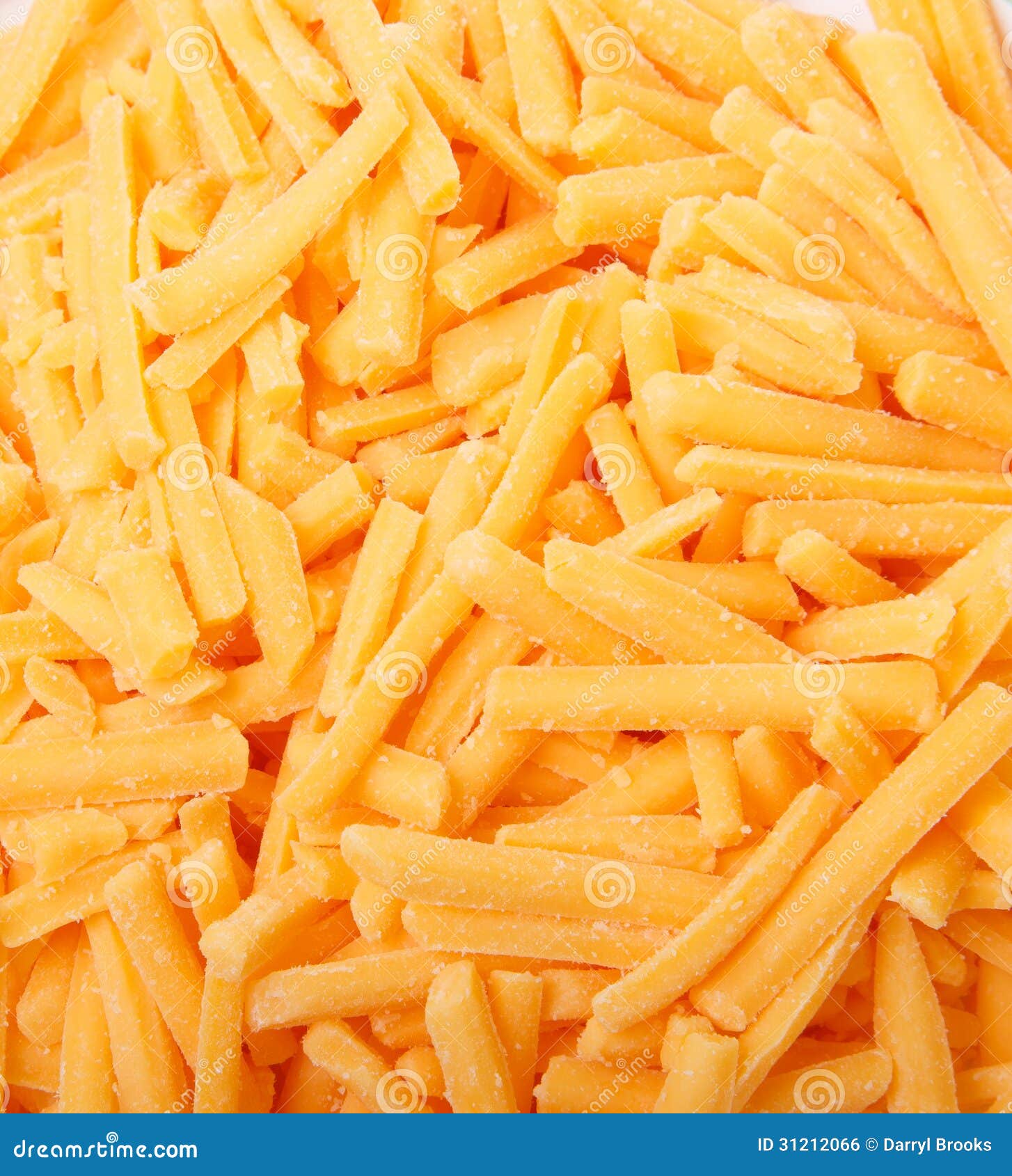 Fresh Shredded Cheddar Cheese Stock Photo - Image of shredded, shaved ...