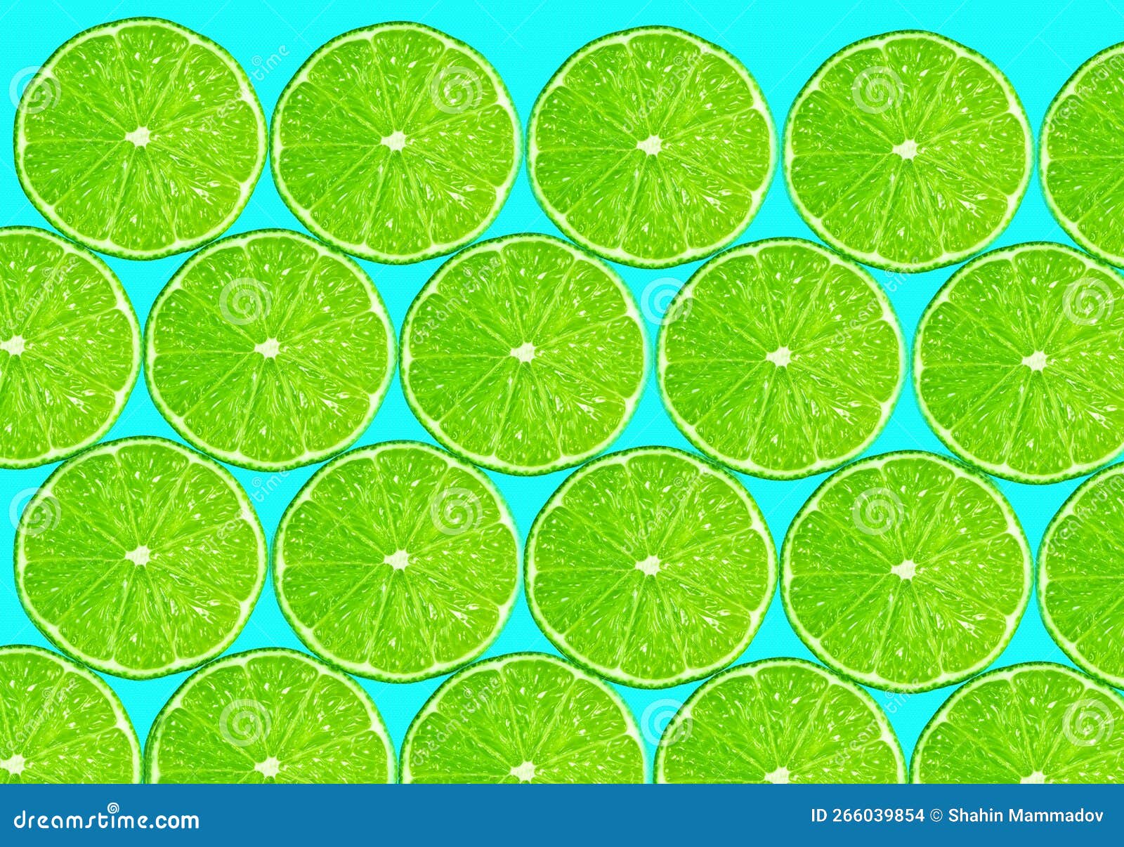 Fresh Slice of Green Lemon on Blue Background. Texture Stock Photo ...
