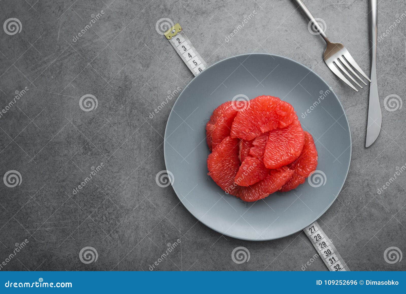 Fresh Sliced Grapefruit on a Plate Stock Photo - Image of round ...