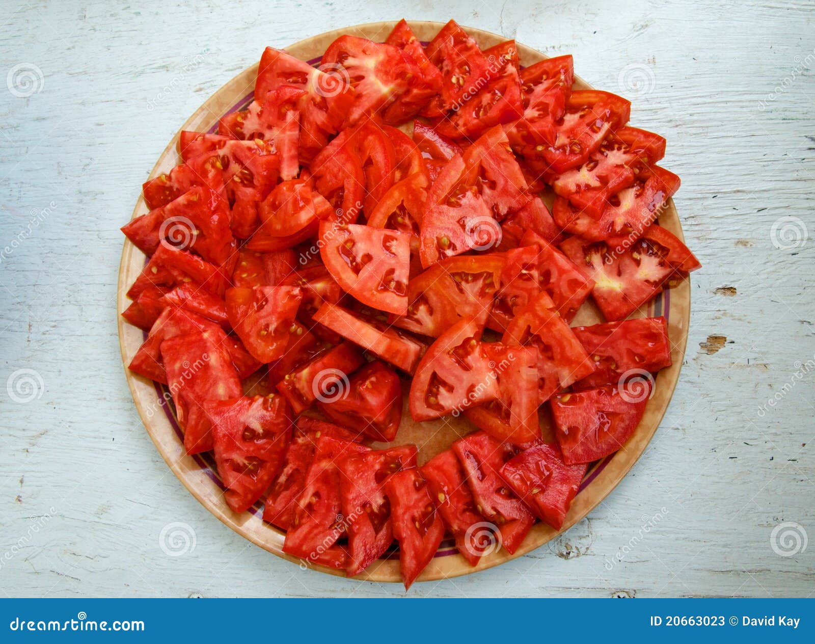 Fresh sliced tomatoes stock image. Image of food, plate - 20663023