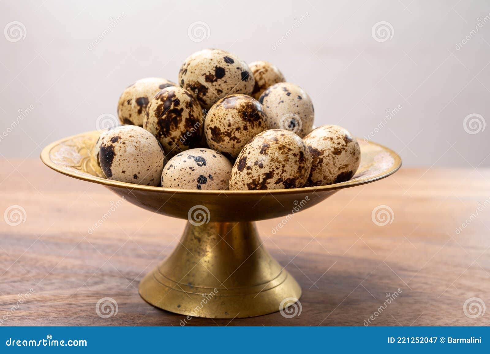 Fresh Small Spotted Partridge Eggs on Bronze Plate Stock Image - Image ...