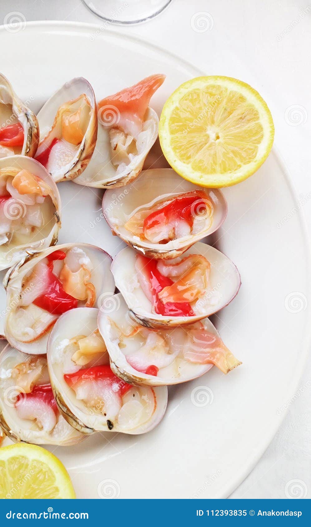 Fresh Spanish Conchas Finas at Plate with Lemon Stock Image - Image of ...