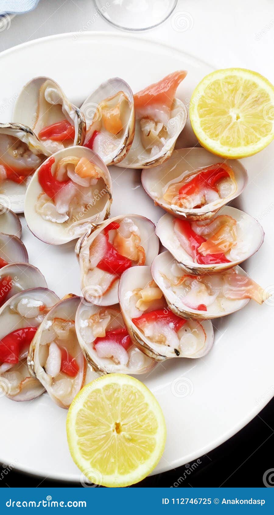 Fresh Spanish Conchas Finas at Plate with Lemon Stock Image - Image of ...