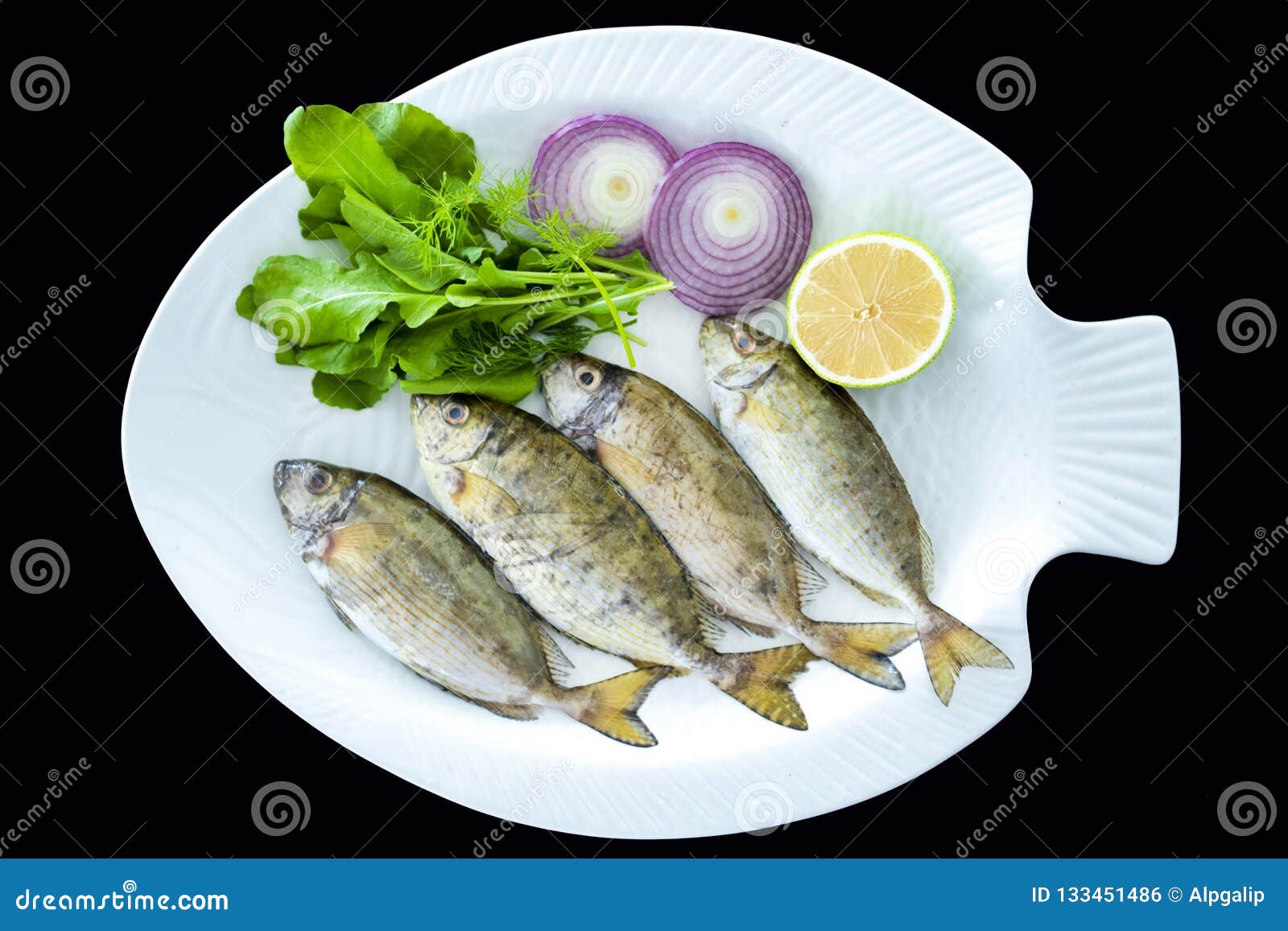 Fresh Spotted Spinefoot Fish with Rockets Leaves Served on White Plate ...