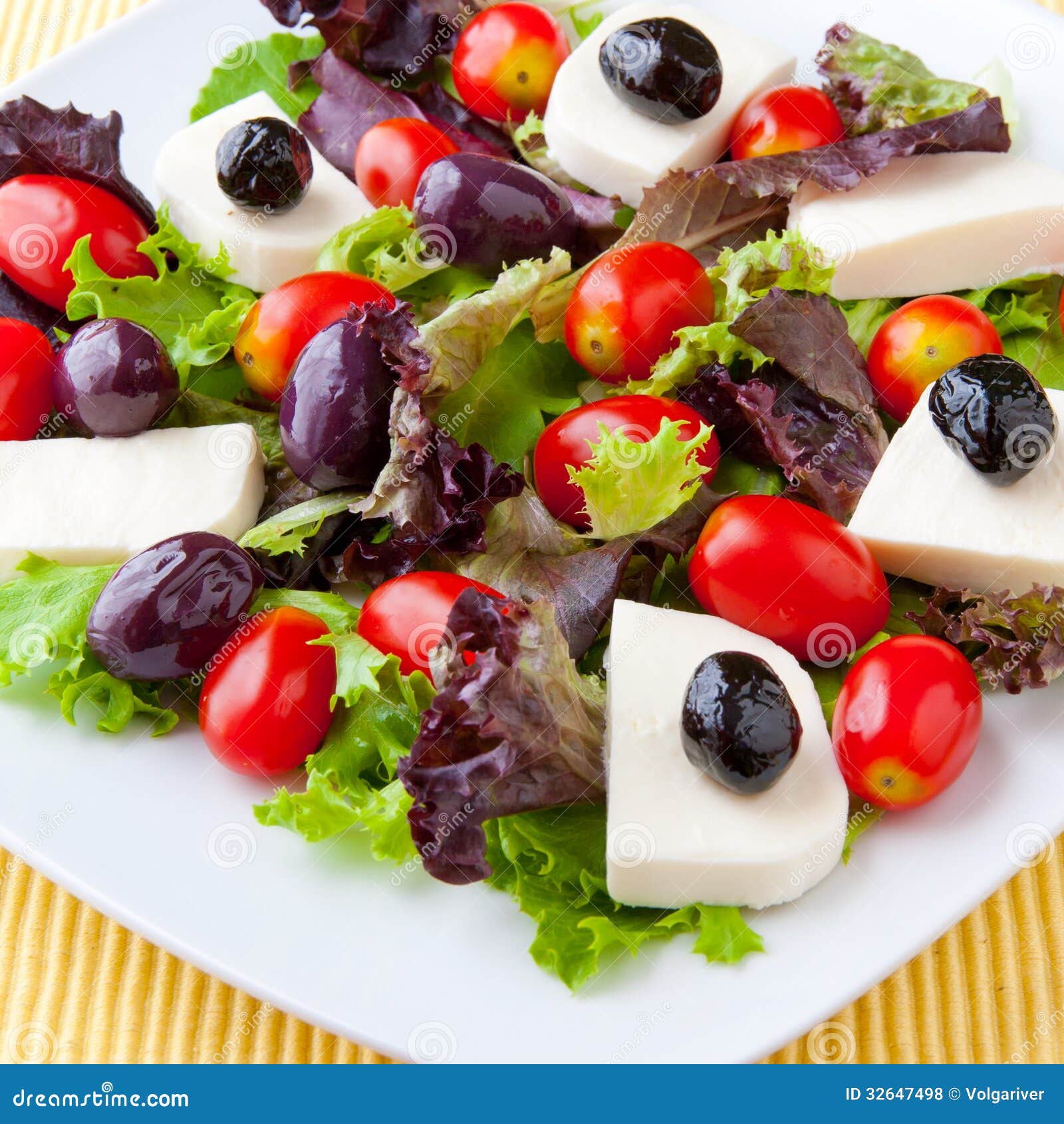 Fresh Spring Mix Salad with Tomatoes, Mozzarella and Olives. Stock ...
