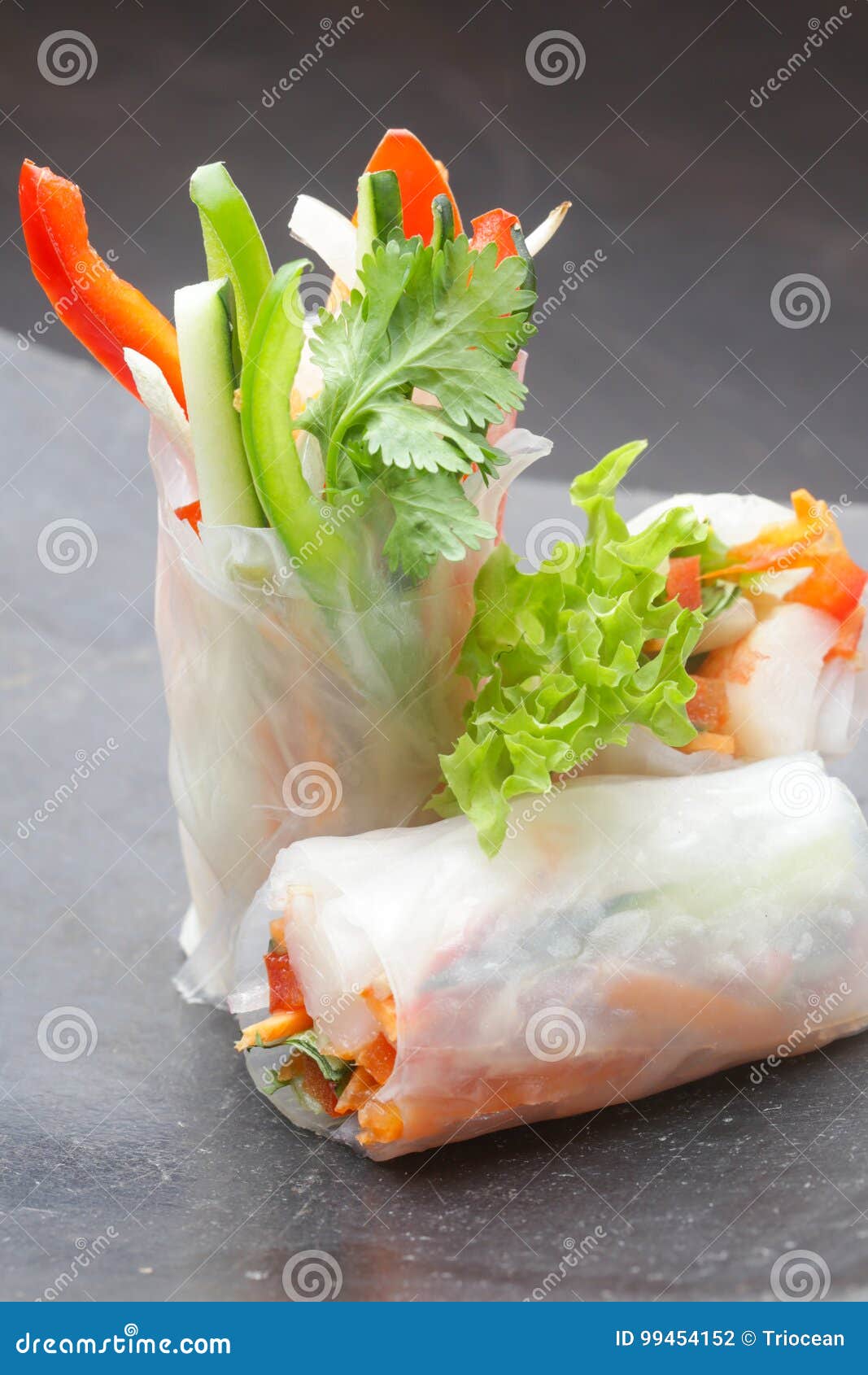 Fresh spring rolls wrappes stock photo. Image of coriander - 99454152