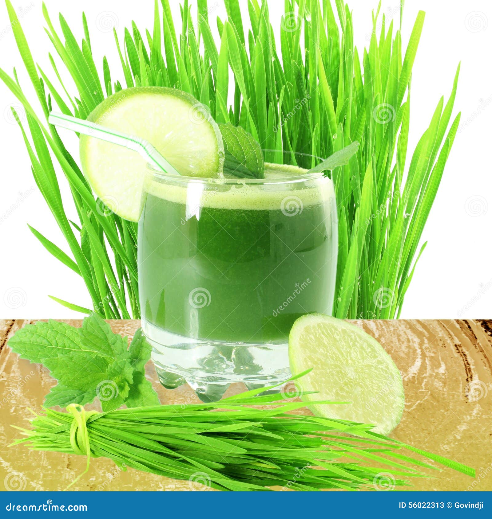Fresh Sprouted Wheat Grass Juice with Wheat Grass in White Background ...