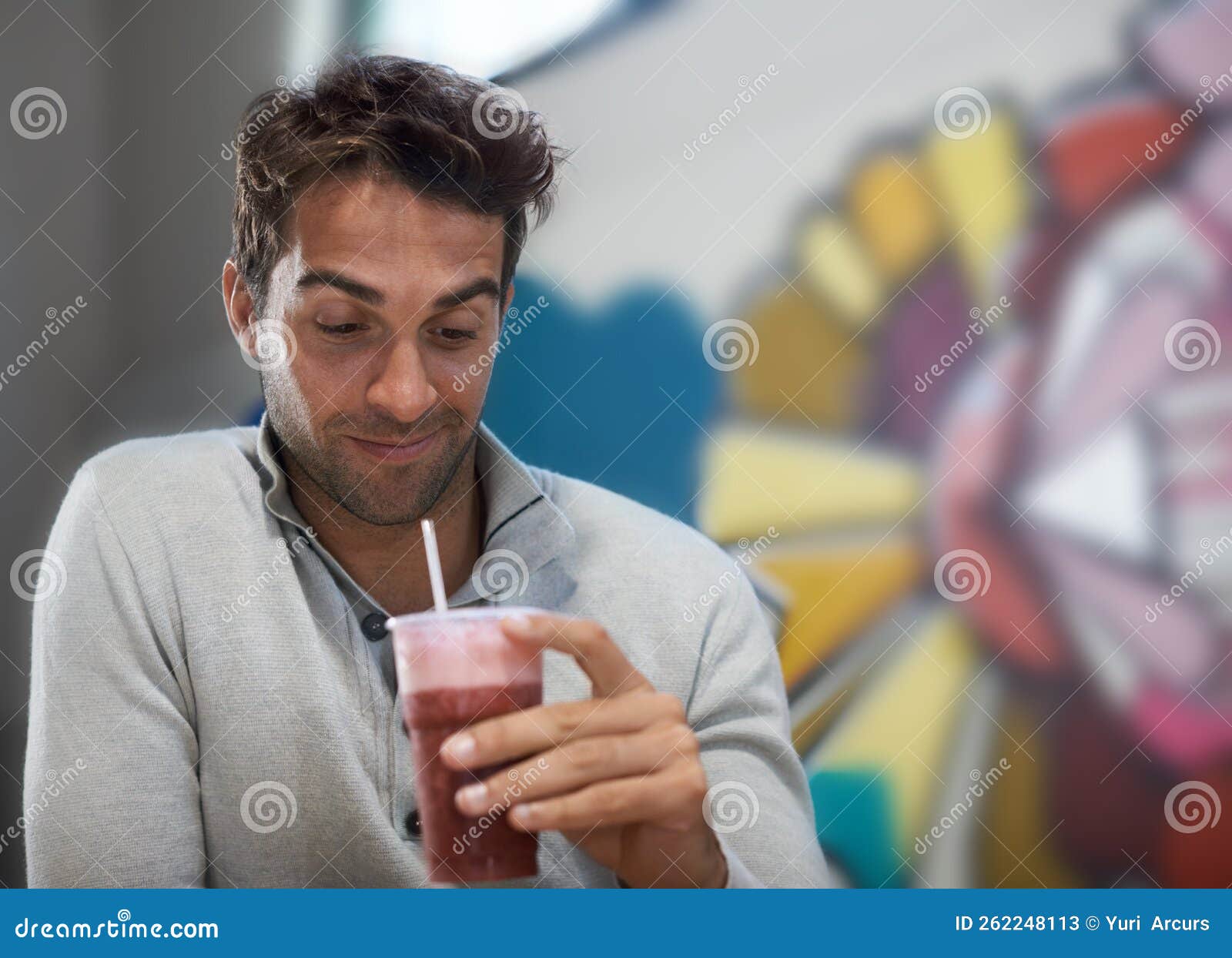 Fresh Squeezed Refreshment. a Handsome Man Drinking a Smoothie at a ...