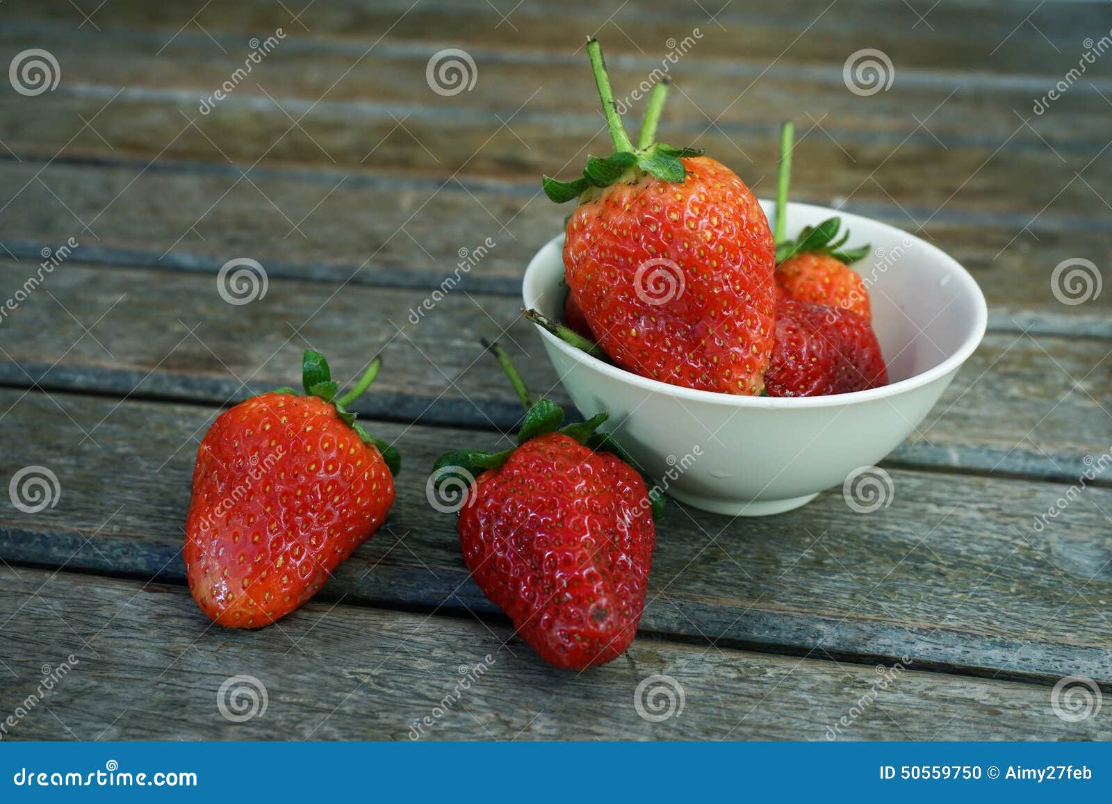 Fresh Strawberries In Bowl On Wooden Table Stock Photo - Image of ...
