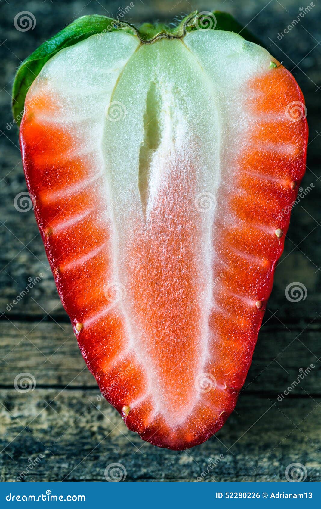 Fresh Strawberries Cut in Half Stock Photo - Image of seasonal, green ...