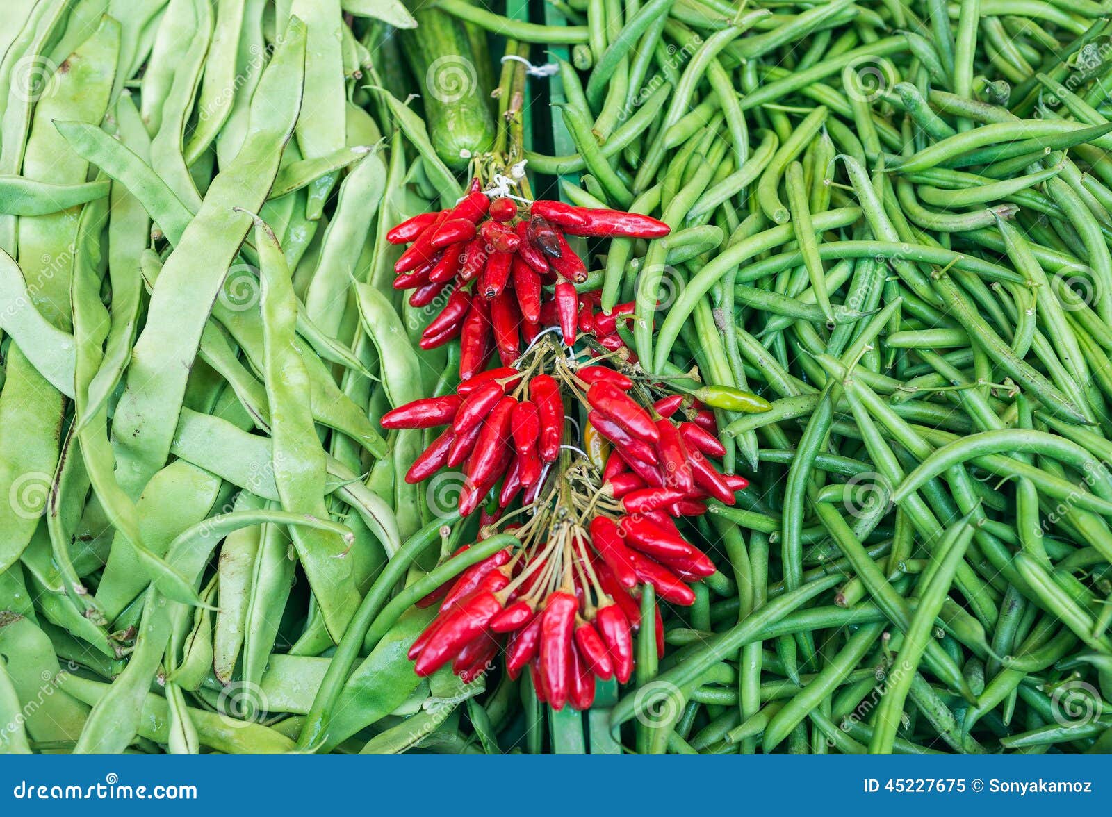 Fresh String Beans and Red Chili Peppers on a Market Stall Stock Image ...