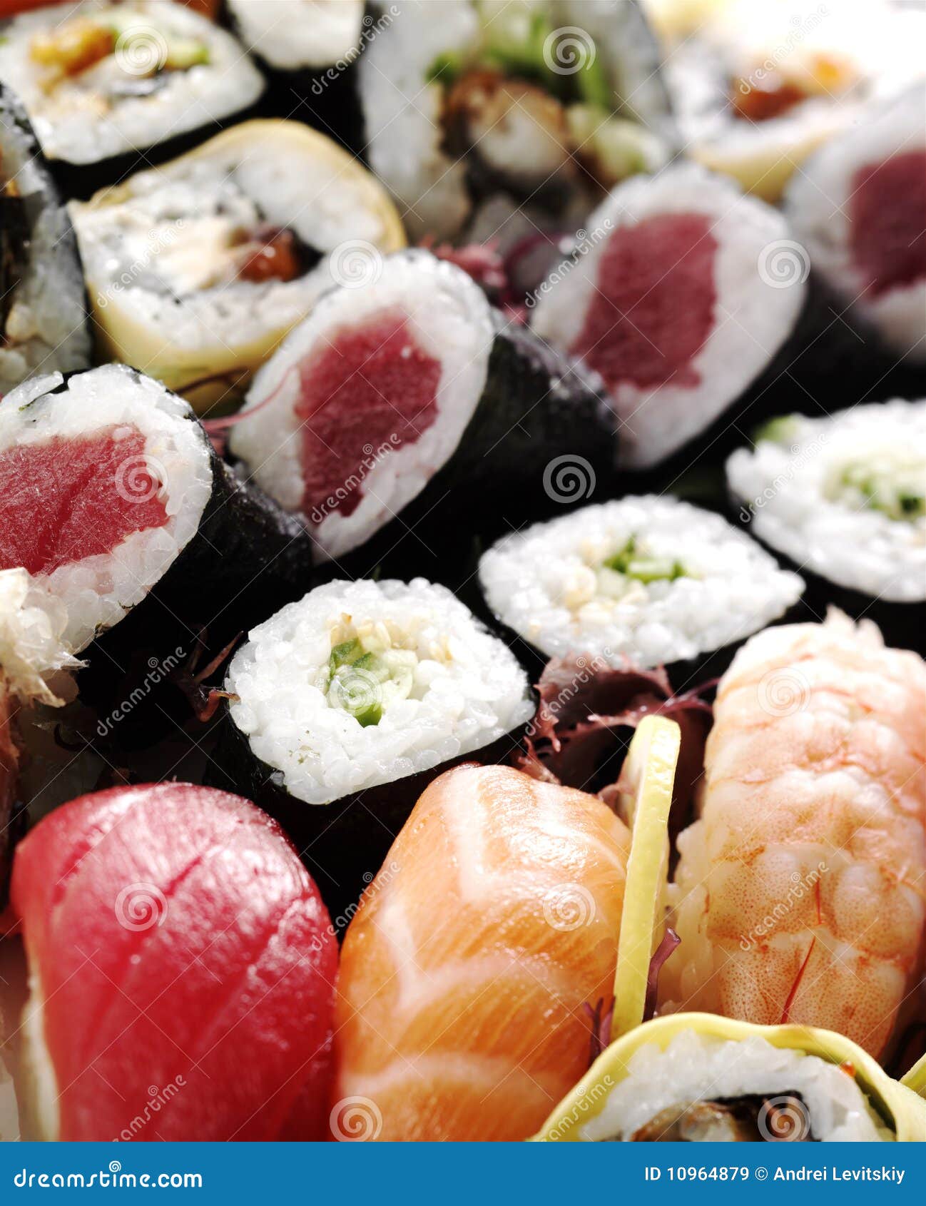 Fresh Sushi Rolls With Tuna And Tender Curd Cheese Laid Out On A Banana ...