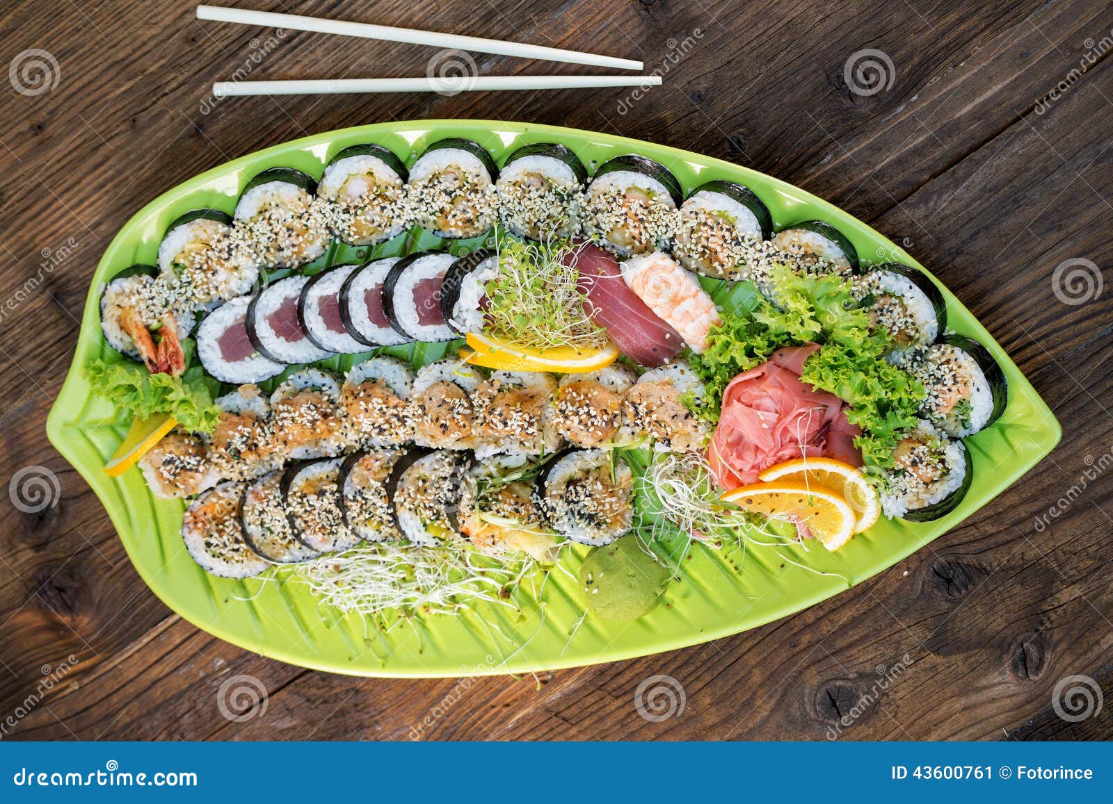 Fresh Sushi Rolls With Tuna And Tender Curd Cheese Laid Out On A Banana ...