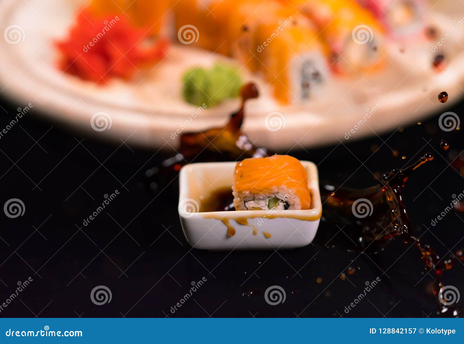 Fresh Sushi Roll Splashing into Soy Sauce Stock Image - Image of ...