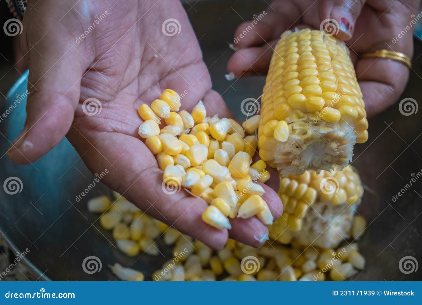 Fresh Sweet Corn Grains Separating from the Corncob . Stock Image ...