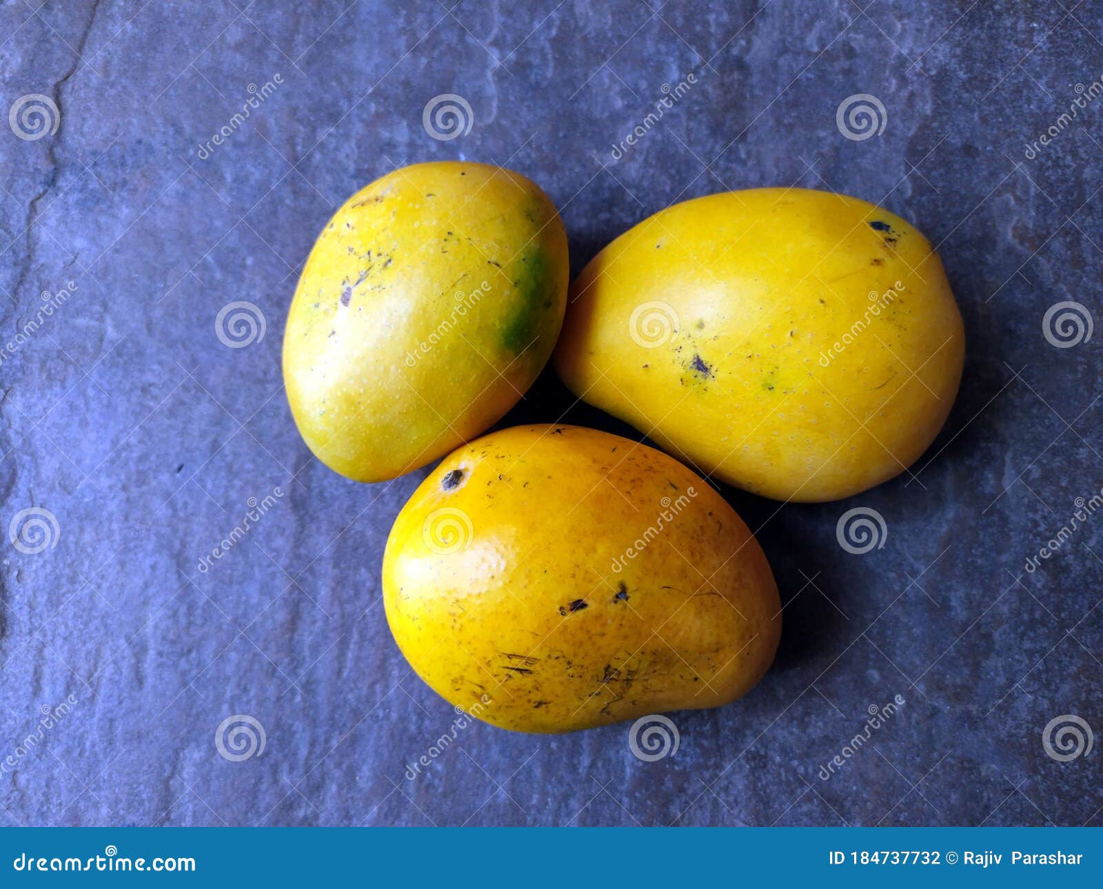 Fresh Sweet Yellow Mango Isolated on Stone Background Stock Photo ...