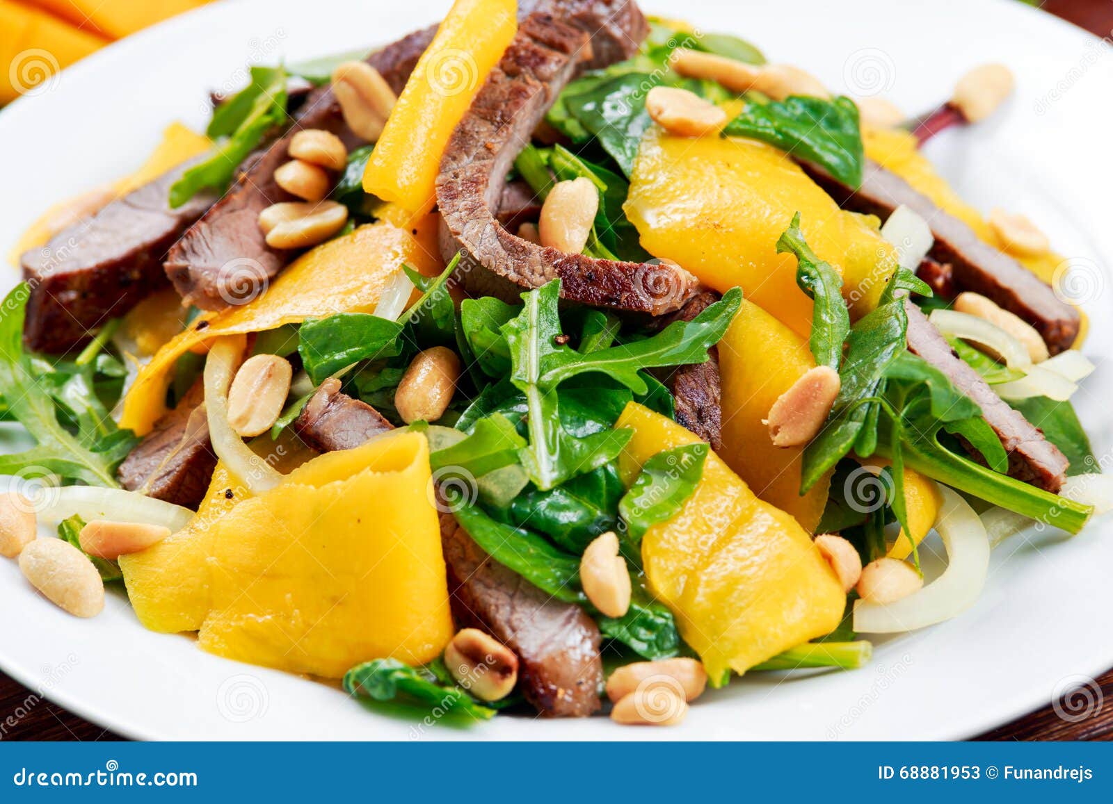Fresh Tasty Mango, Beef Salad with Vegetables and Nuts. Stock Image ...