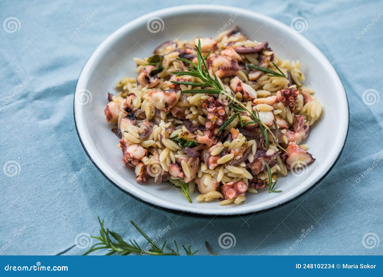 Fresh and Tasty True Greek Kritharaki with Octopus Stock Photo - Image ...