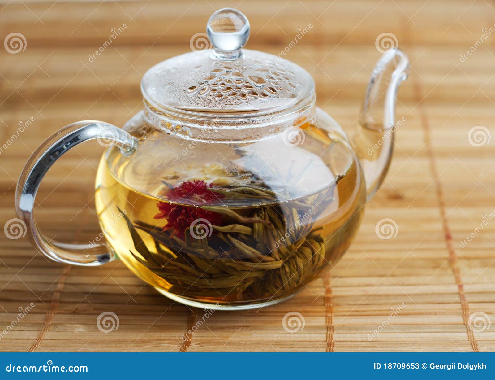 Fresh tea in glass teapot stock image. Image of drop - 18709653