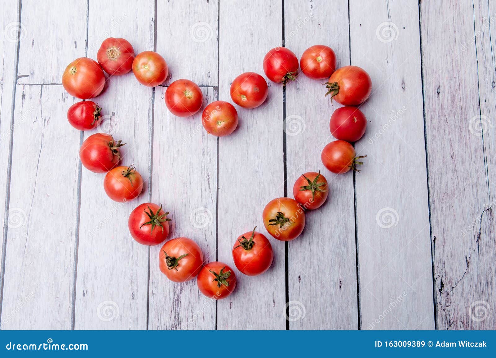 Fresh Tomatoes Arranged in a Heart Shape. Fresh Tomatoes Arranged in a ...